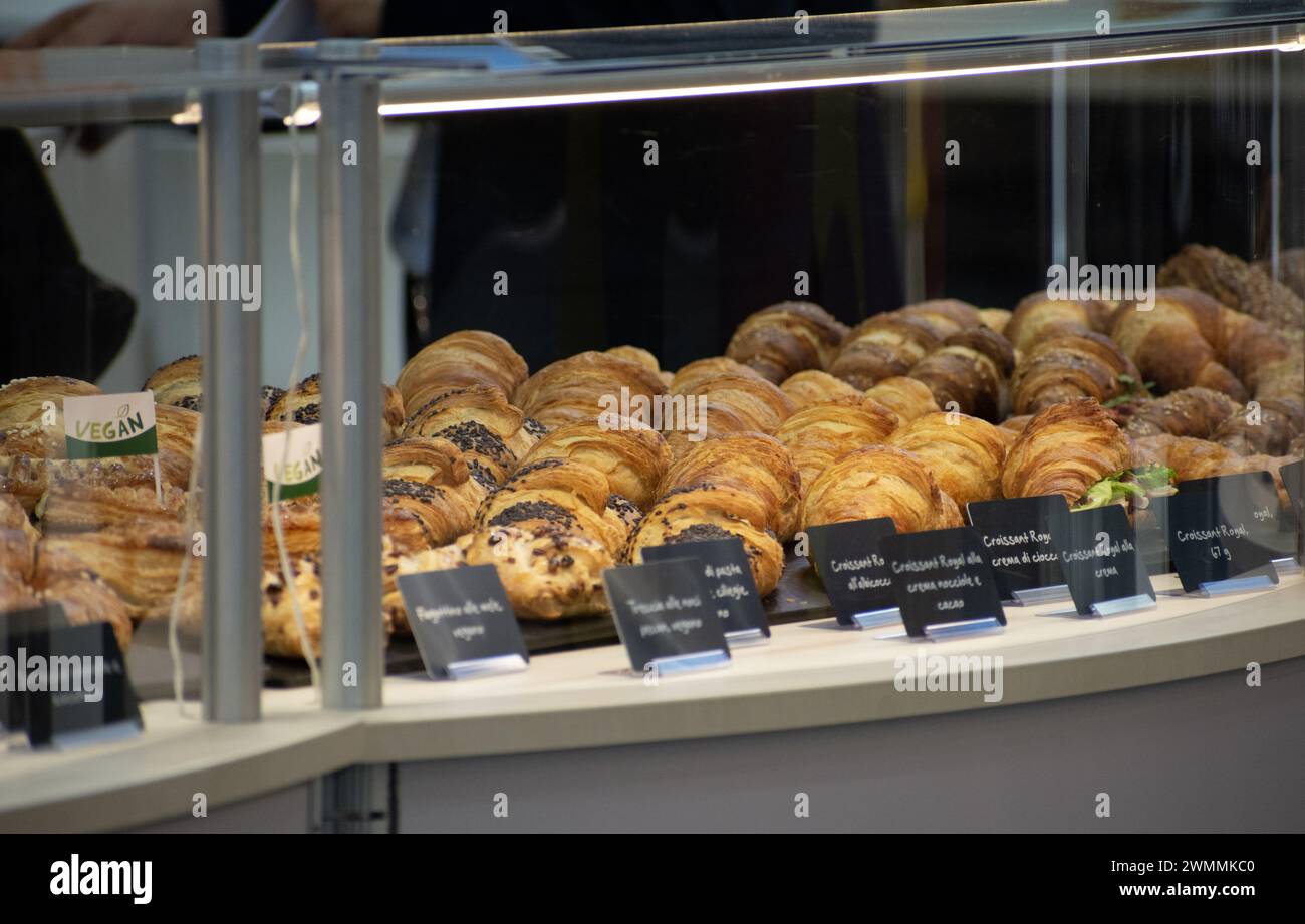 A bakery counter with croissants on display Stock Photo - Alamy