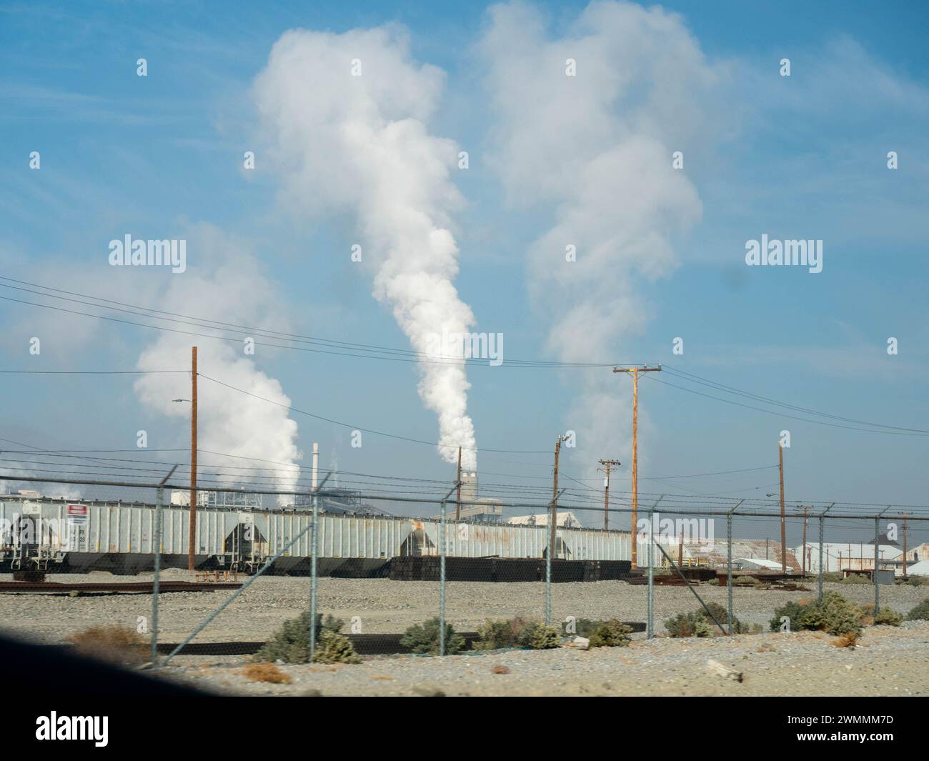 Searles Valley Cemetery sign with borax processing plant in background ...