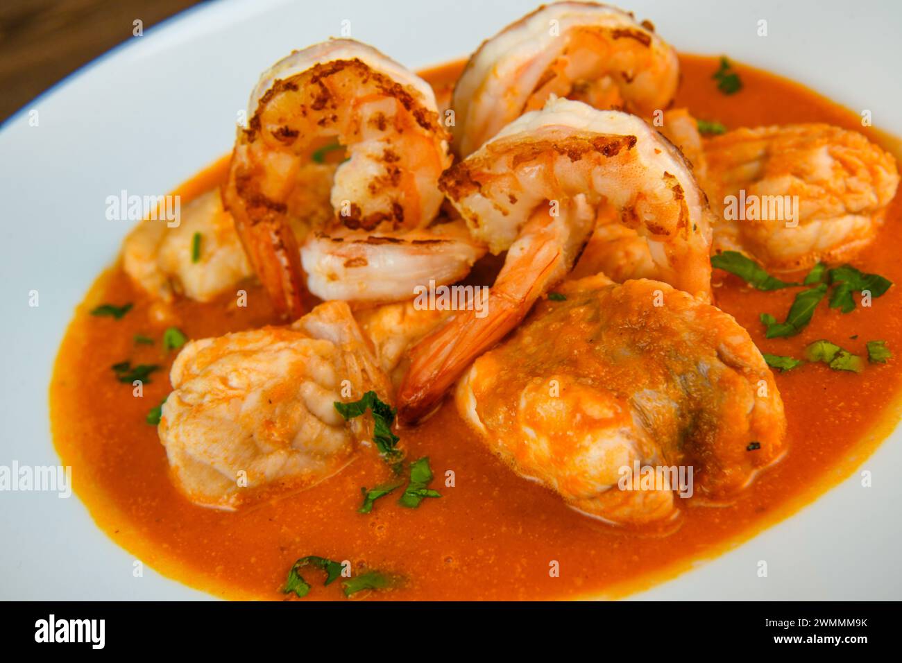 Recipe for Armorican-style monkfish tail, prawns, flambees with cognac ...