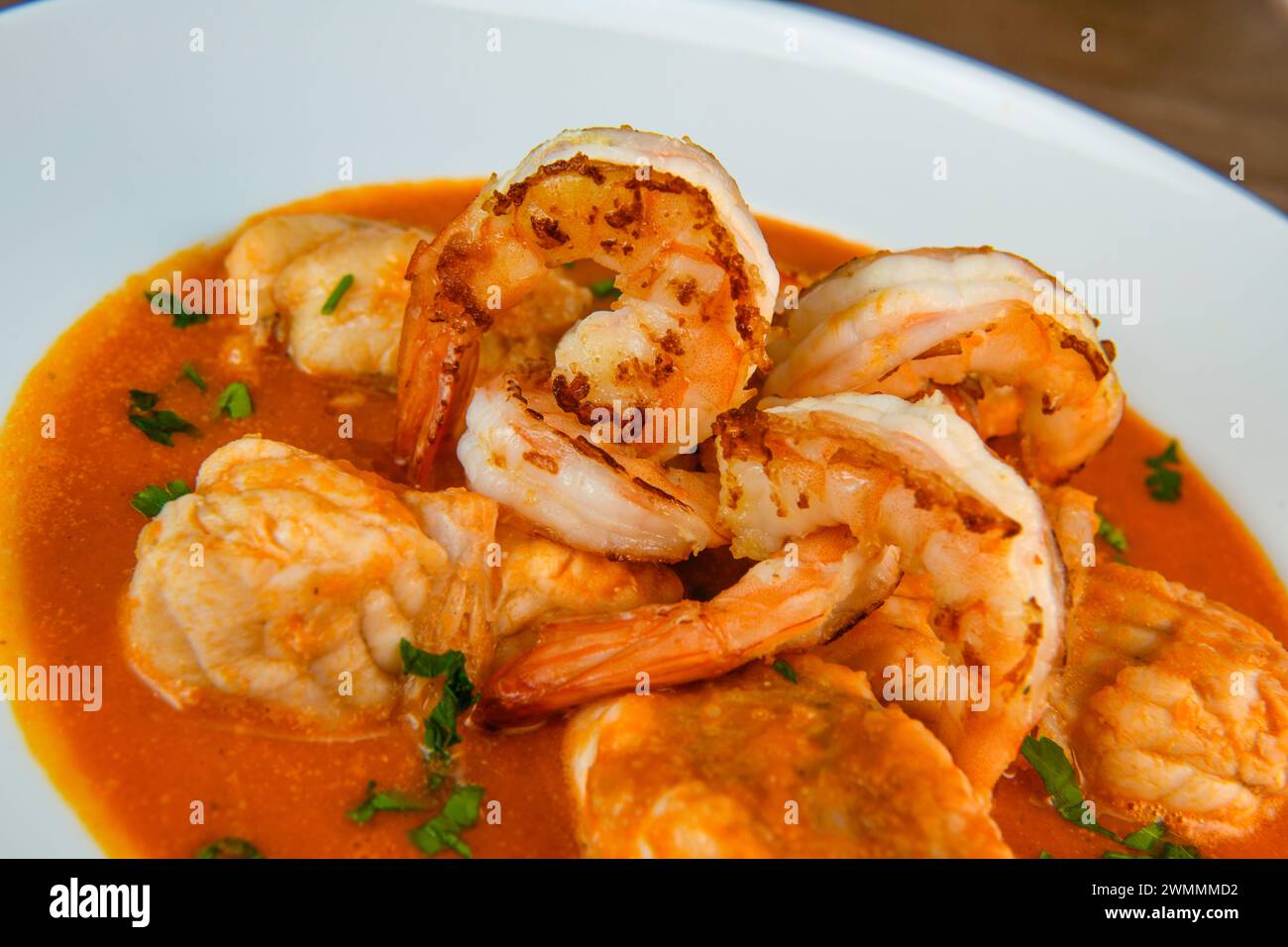Recipe for Armorican-style monkfish tail, prawns, flambees with cognac ...