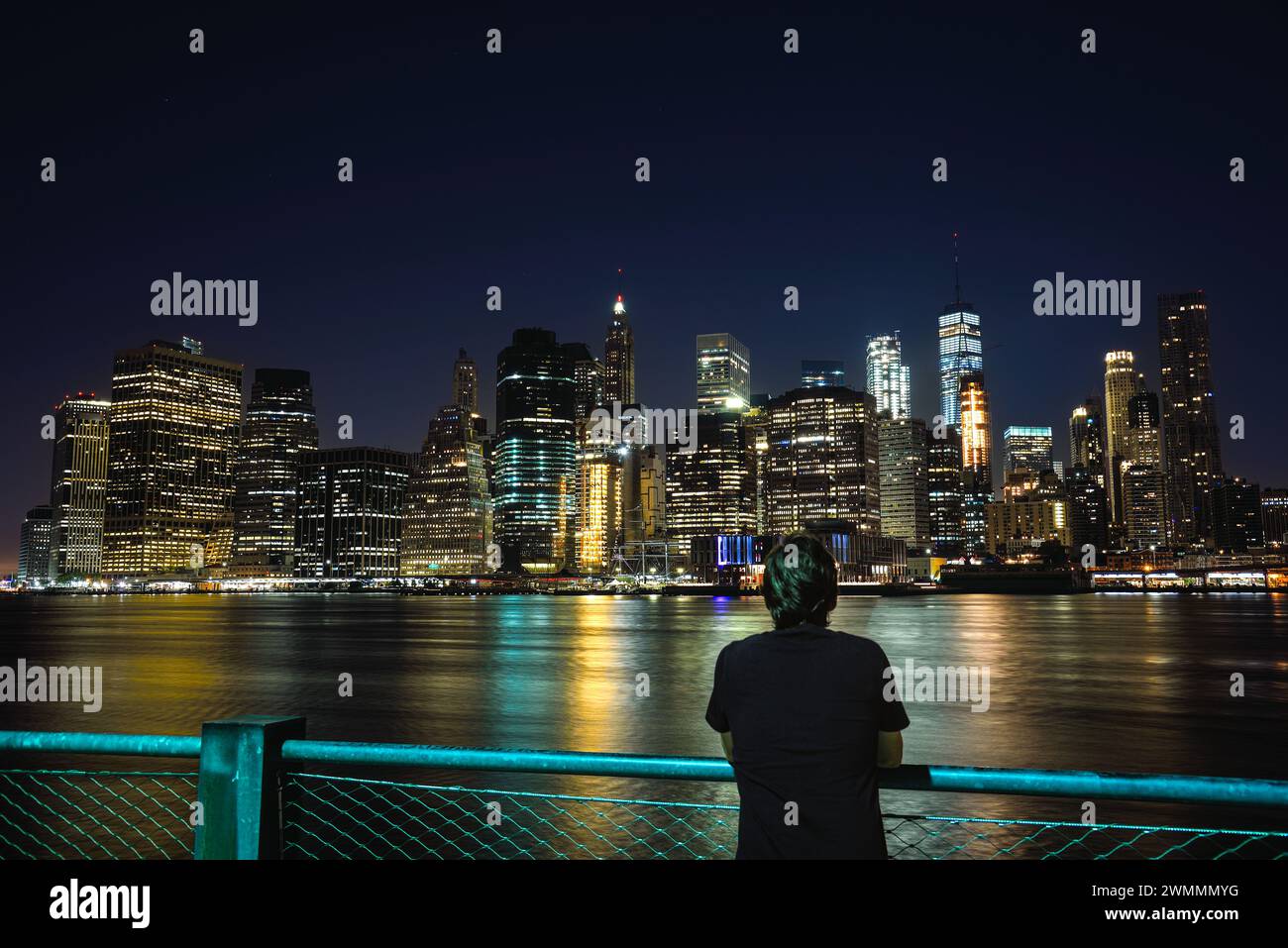 Rear view of a young man looking at view hi-res stock photography and ...
