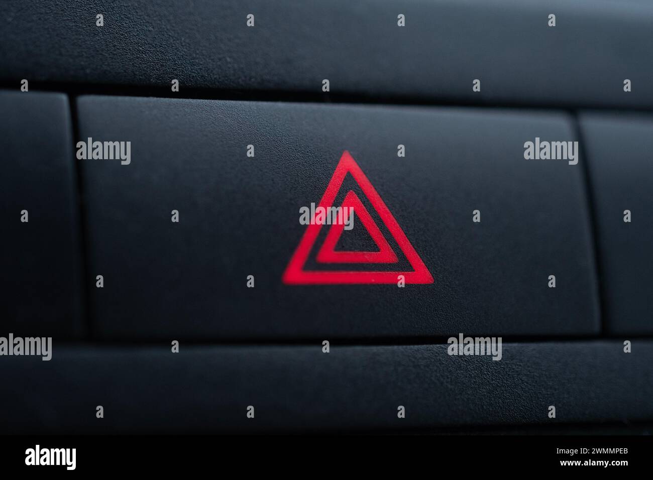 Hazard light indicator on car dashboard, shallow depth of field Stock ...