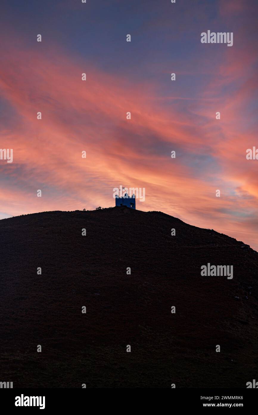 Watchtower on the top of the cliffs with a sunset sky at Boscastle ...