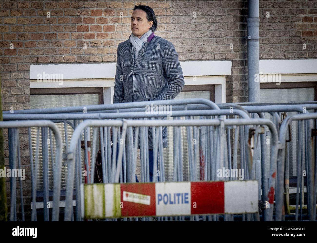 AMSTERDAM - Lawyer Guy Weski arrives at the extra-secure court for the ...