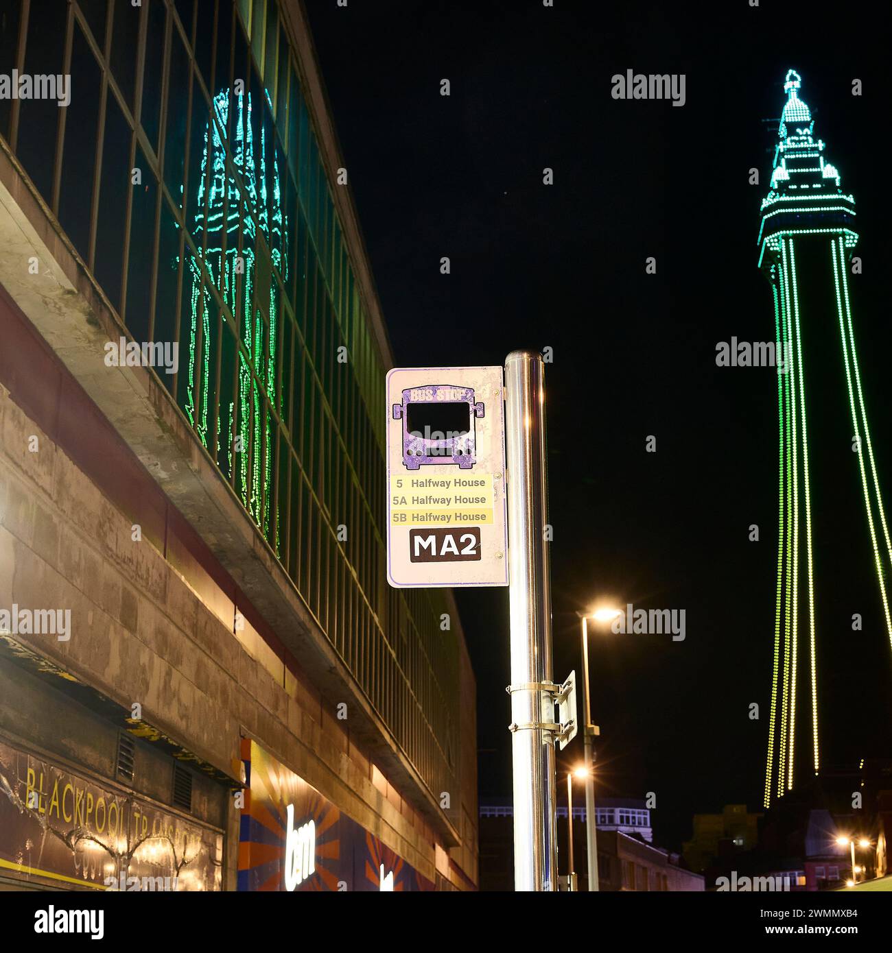 Bus stop sign at night on Market Street,Blackpool Stock Photo - Alamy