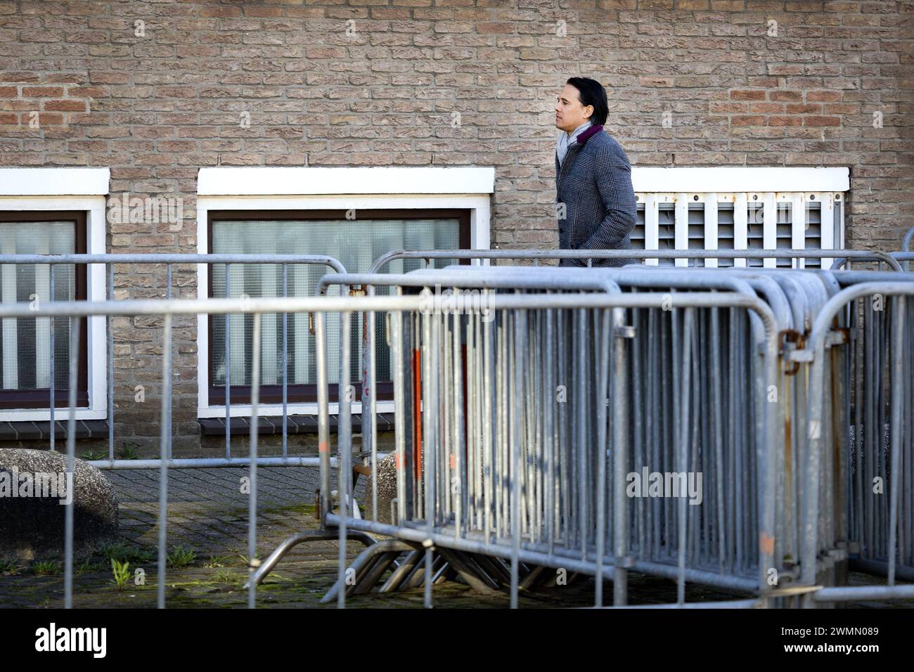 AMSTERDAM - Lawyer Guy Weski arrives at the extra-secure court for the ...