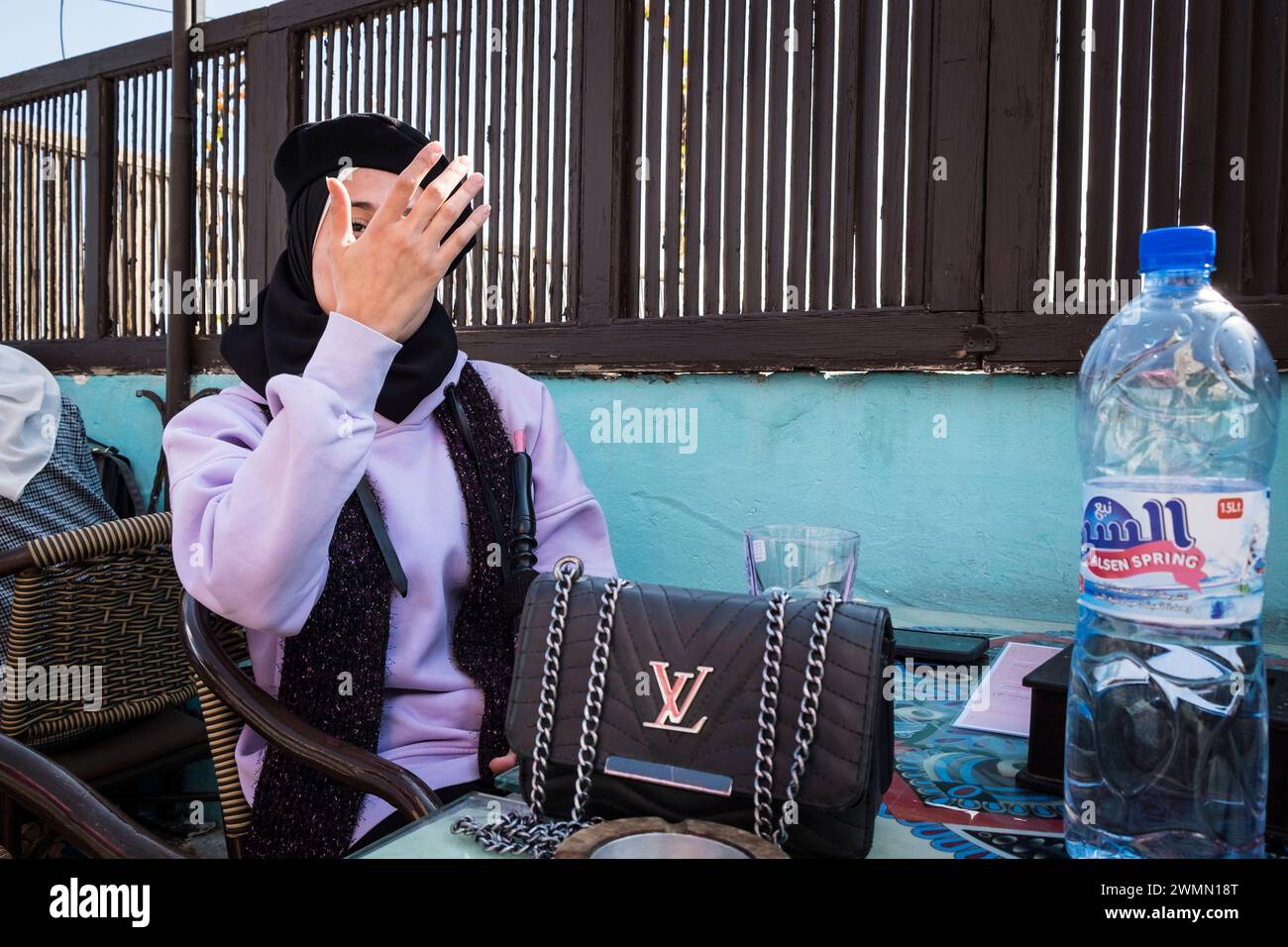 Syria, Damascus, girl smoking shisha Stock Photo - Alamy