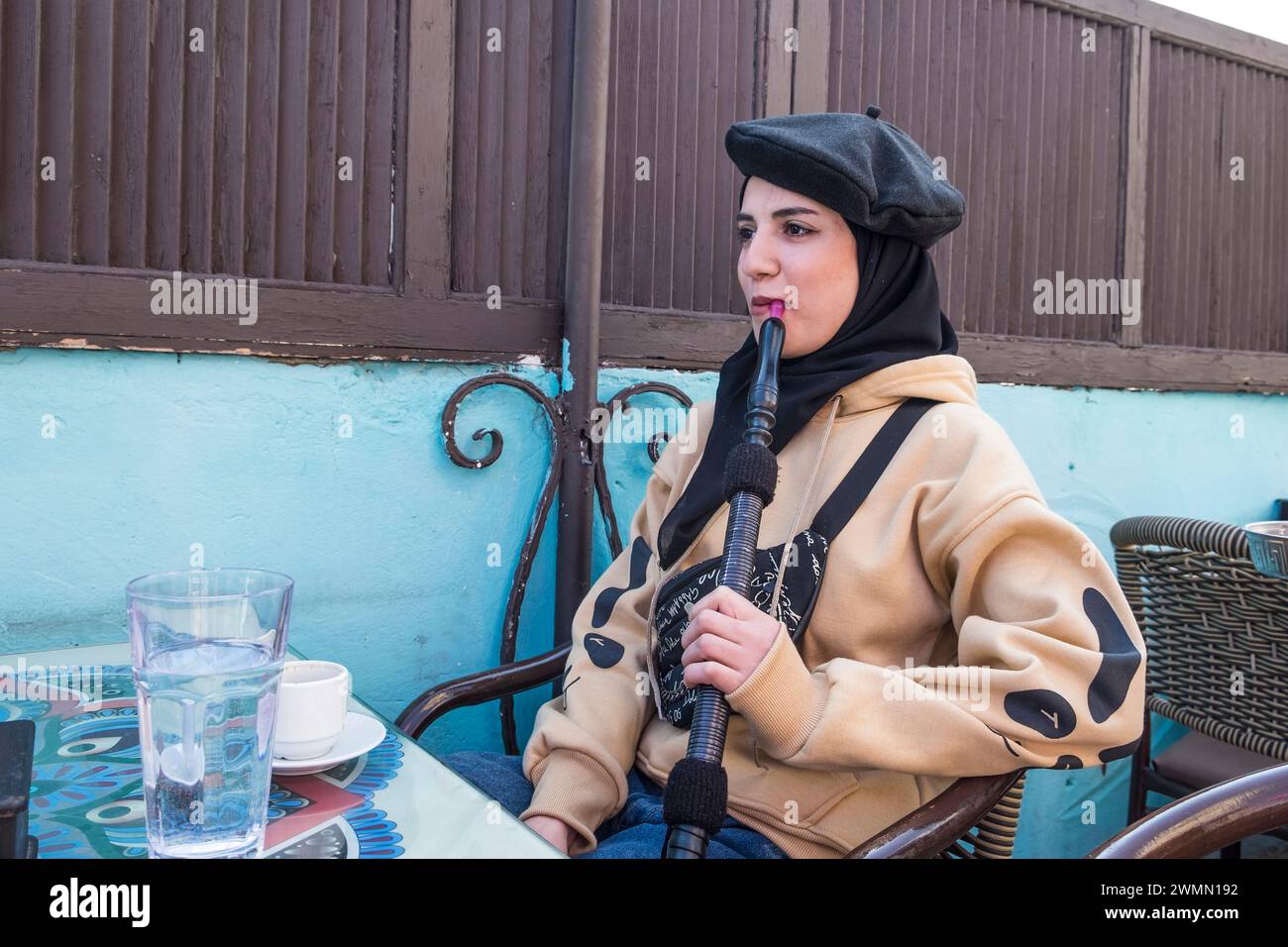 Syria, Damascus, girl smoking shisha Stock Photo - Alamy