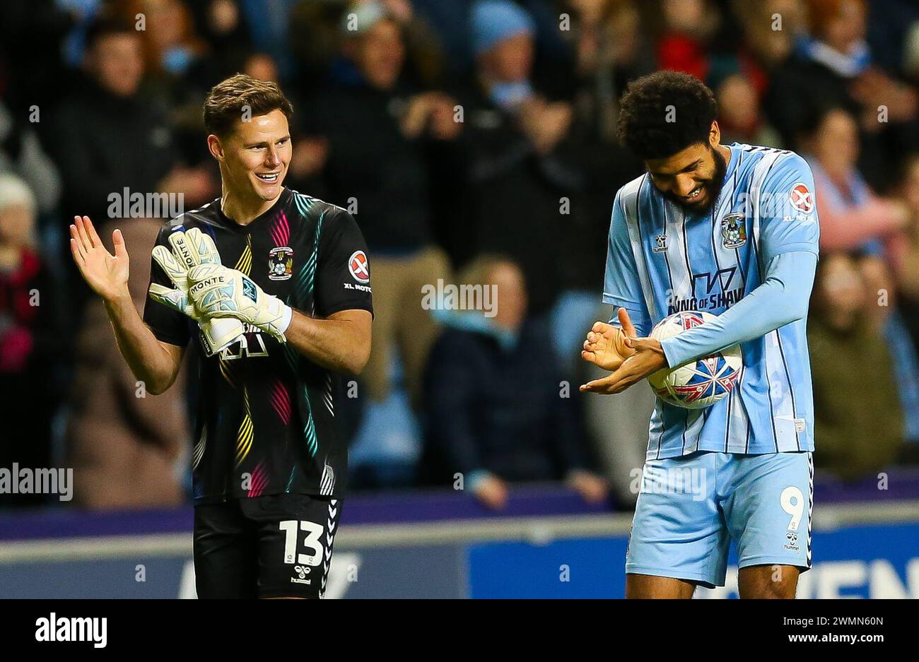 Coventry City goalkeeper Ben Wilson (left) with Ellis Simms after the ...