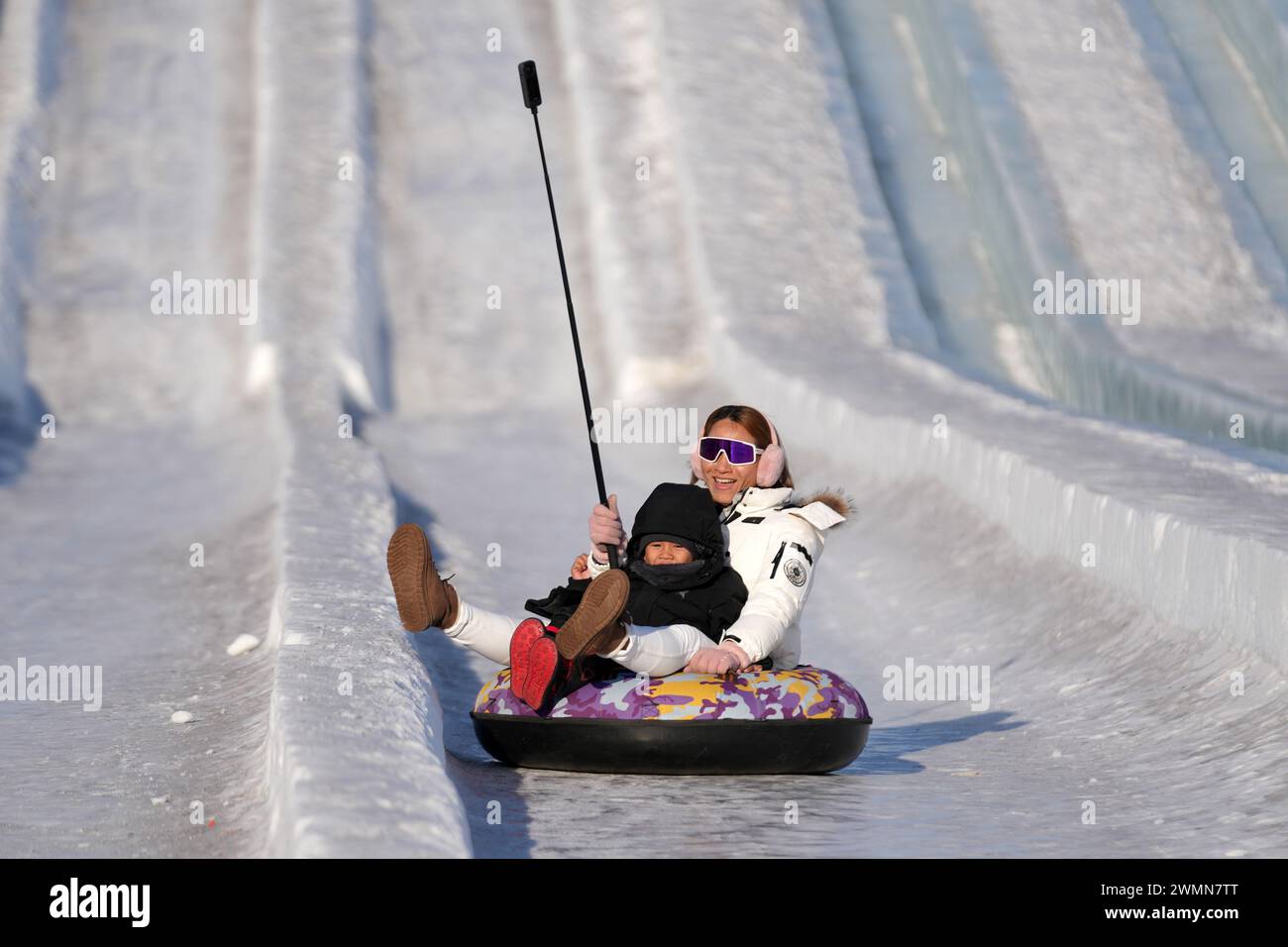 Harbin, China's Heilongjiang Province. 26th Feb, 2024. People enjoy an ...