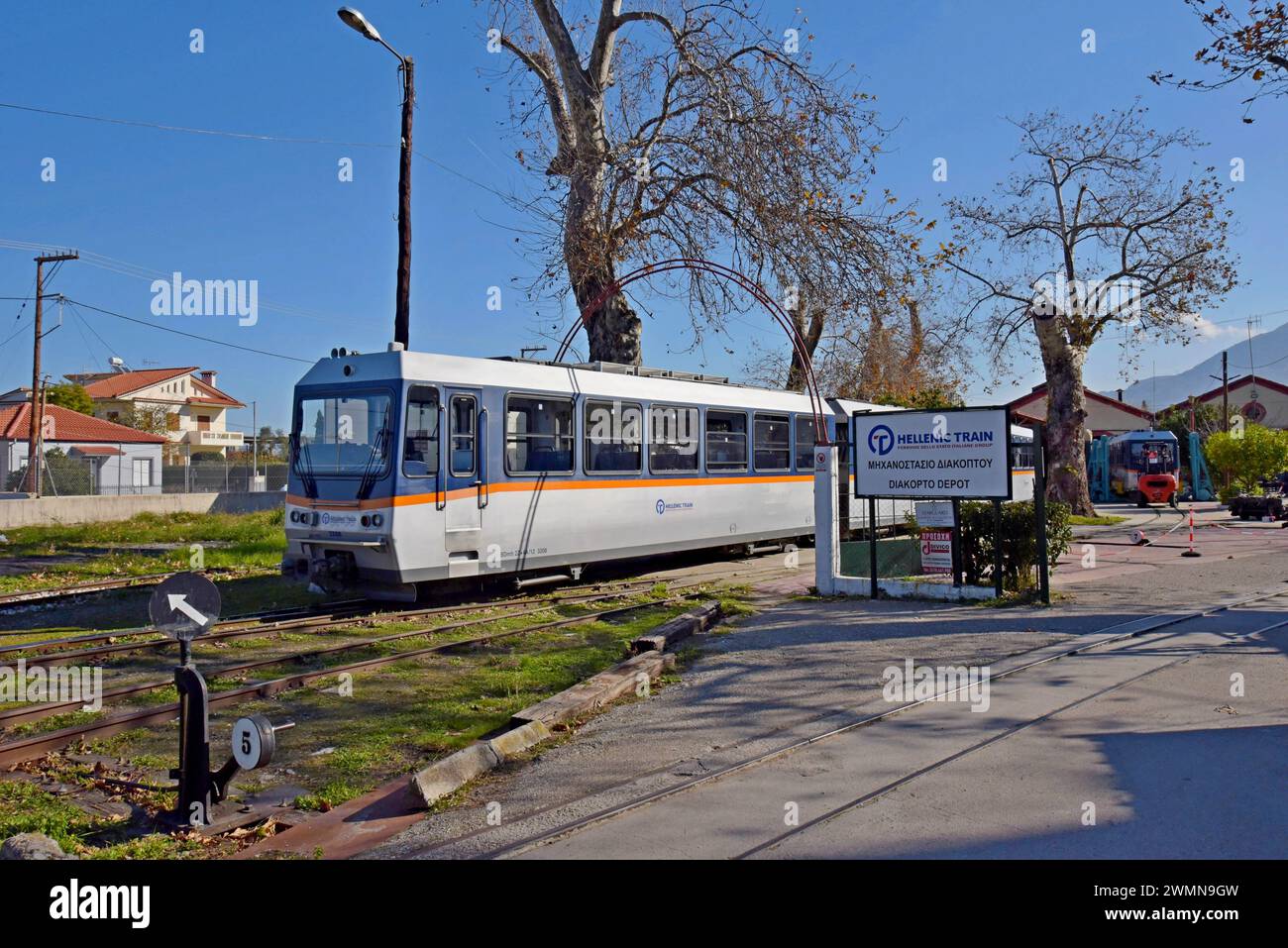 Diesel railcar of the Diakopto rack railway leaving the main depot and ...