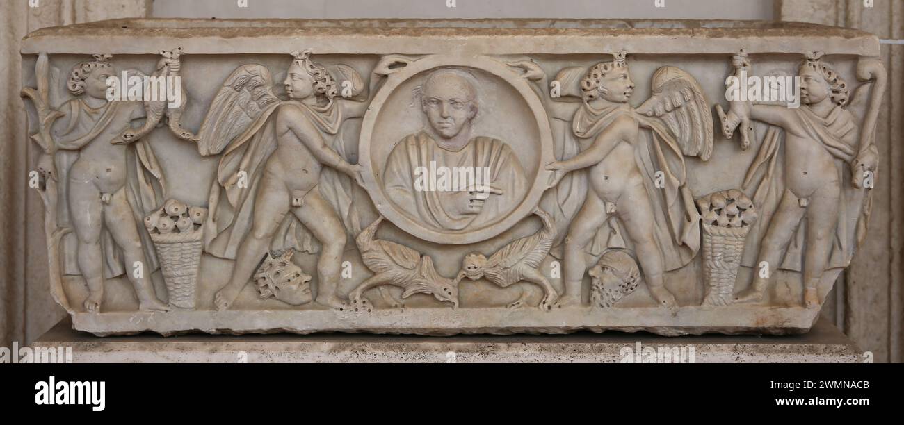 Sarcophagus with man's bust in a clipeus. The image of the deceased ...