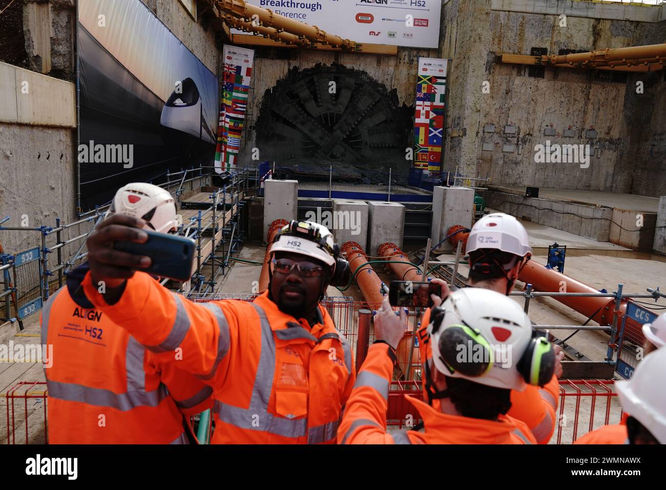 Workers take selfies after digging machine Florence completed HS2's ...