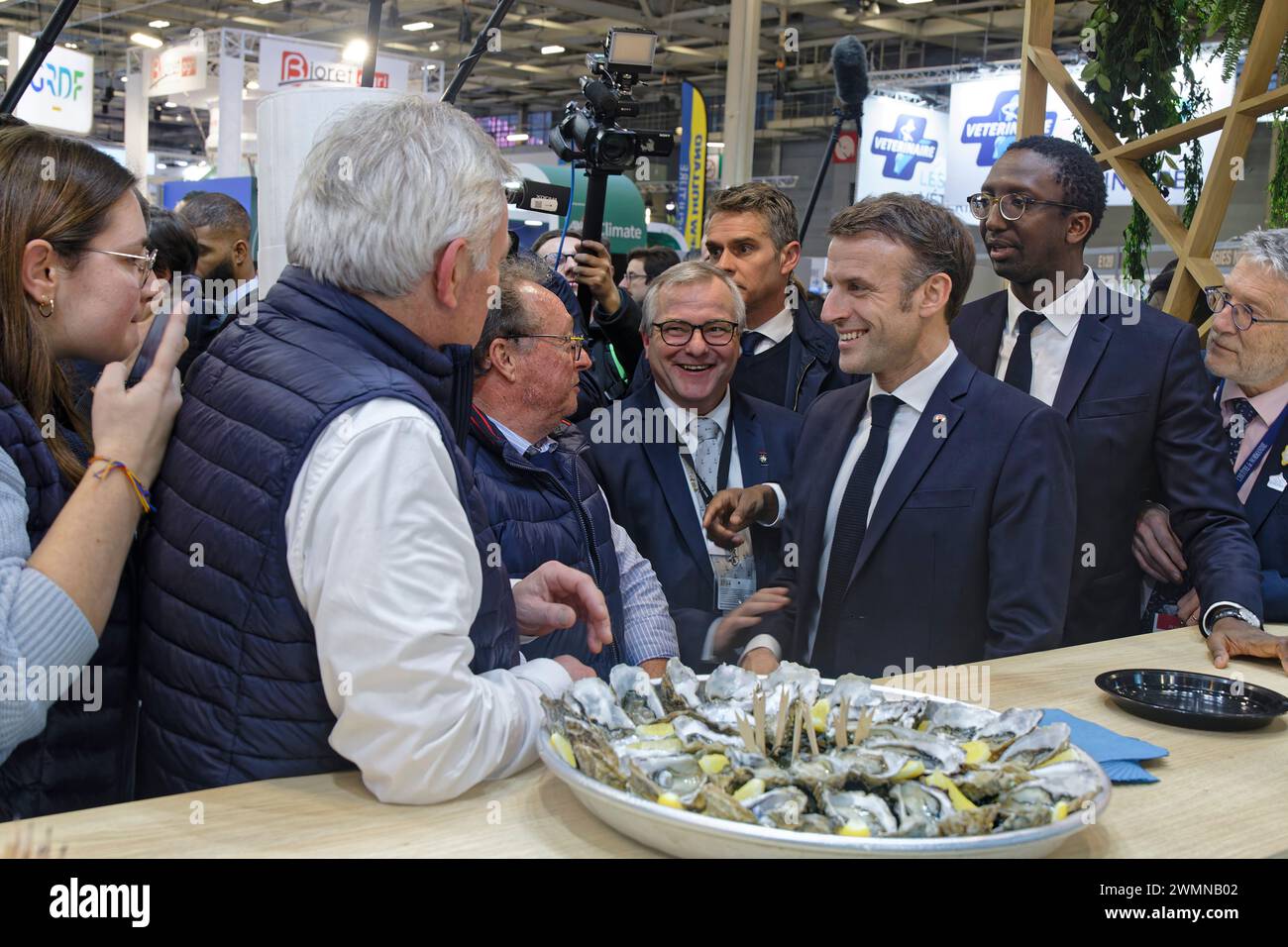 Paris, France. 24th Feb, 2024. French President Emmanuel Macron tastes ...