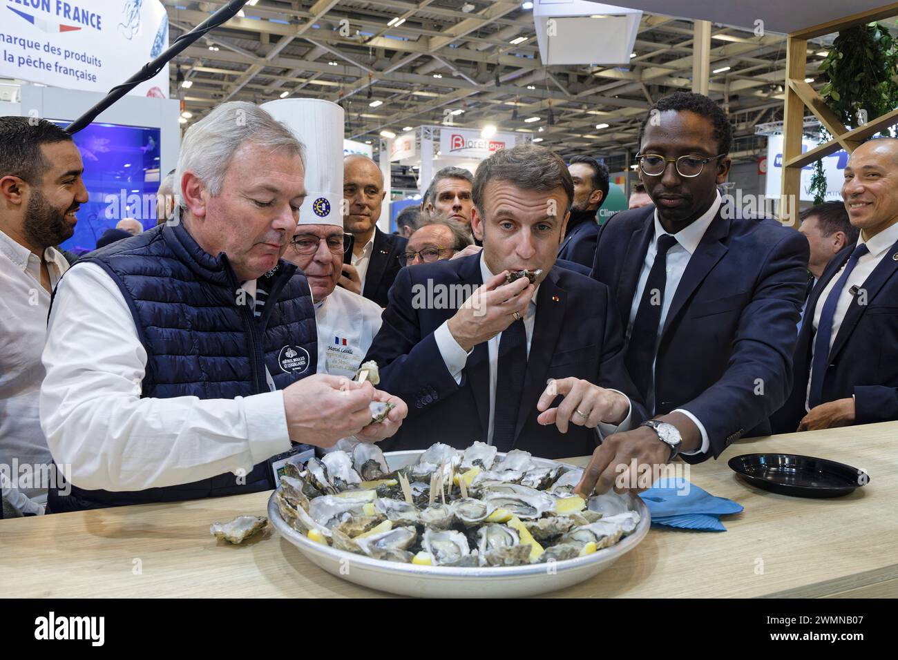 Paris, France. 24th Feb, 2024. French President Emmanuel Macron tastes ...