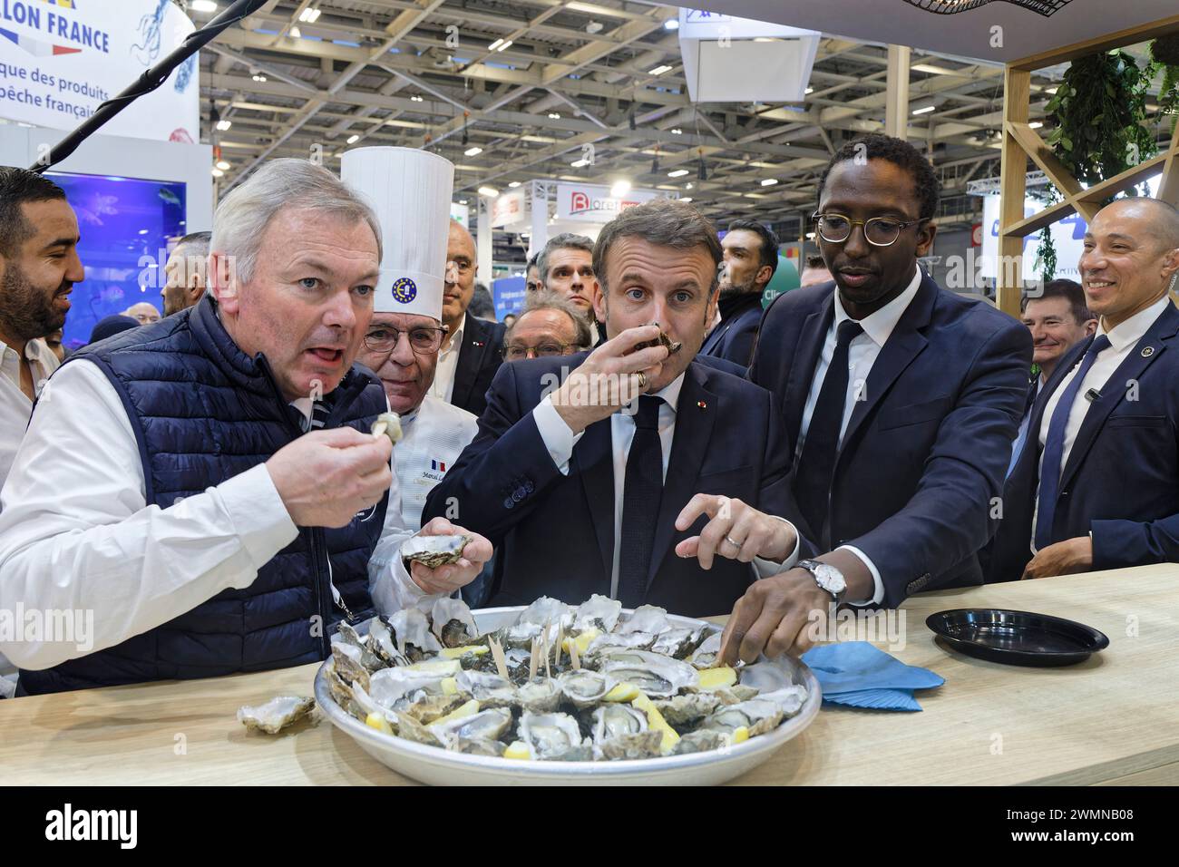 Paris, France. 24th Feb, 2024. French President Emmanuel Macron tastes ...