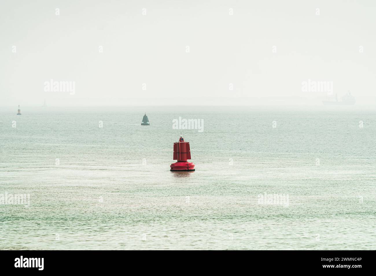 Red and a green light buoys are equipped with a flashing light at the ...