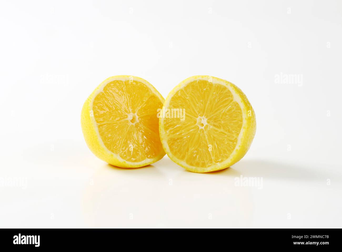 Halved fresh lemon halves two hi-res stock photography and images - Alamy