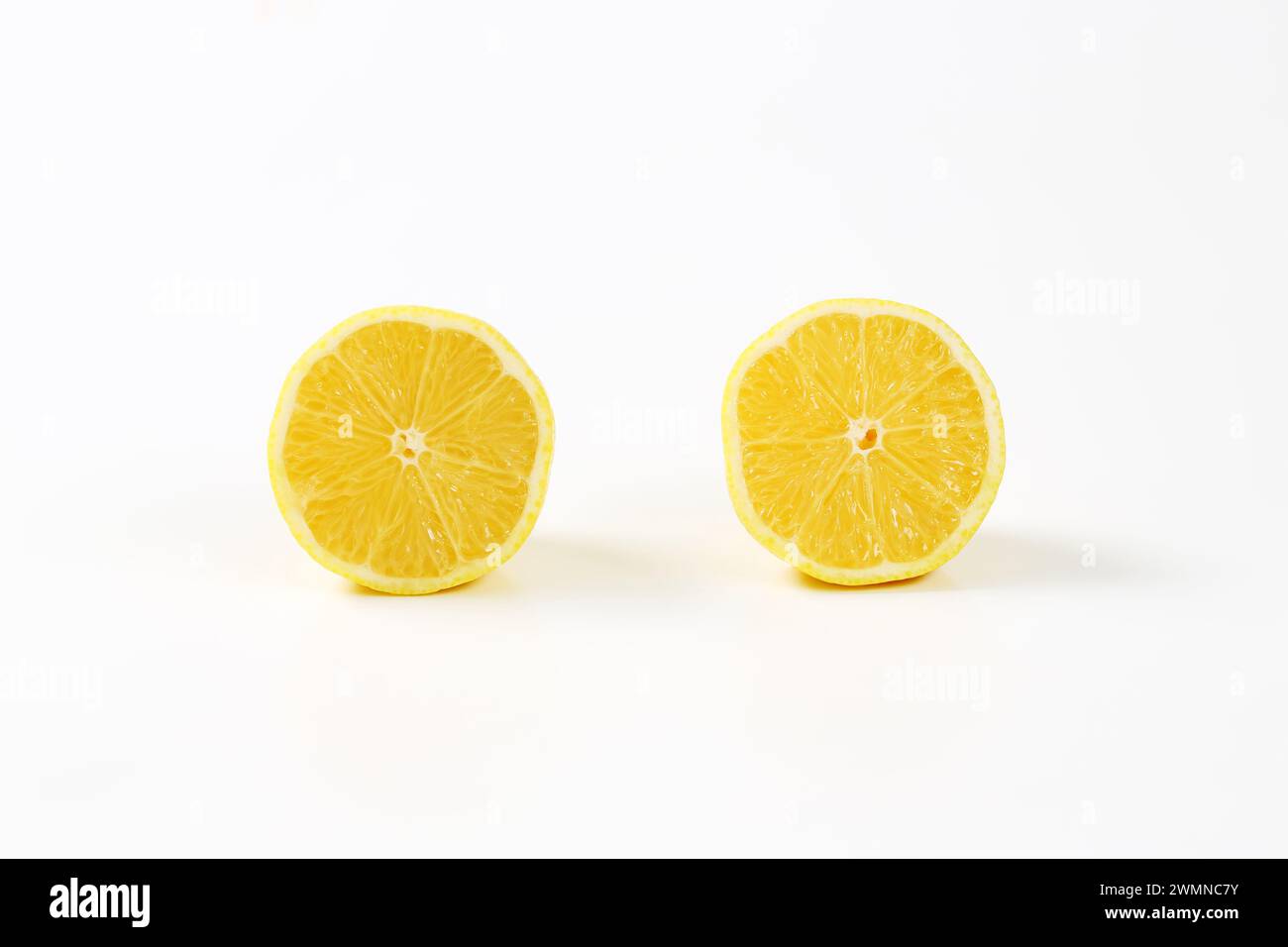 Halved fresh lemon halves two hi-res stock photography and images - Alamy