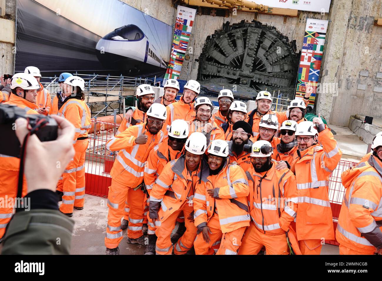 Workers pose for photos after digging machine Florence completed HS2's ...