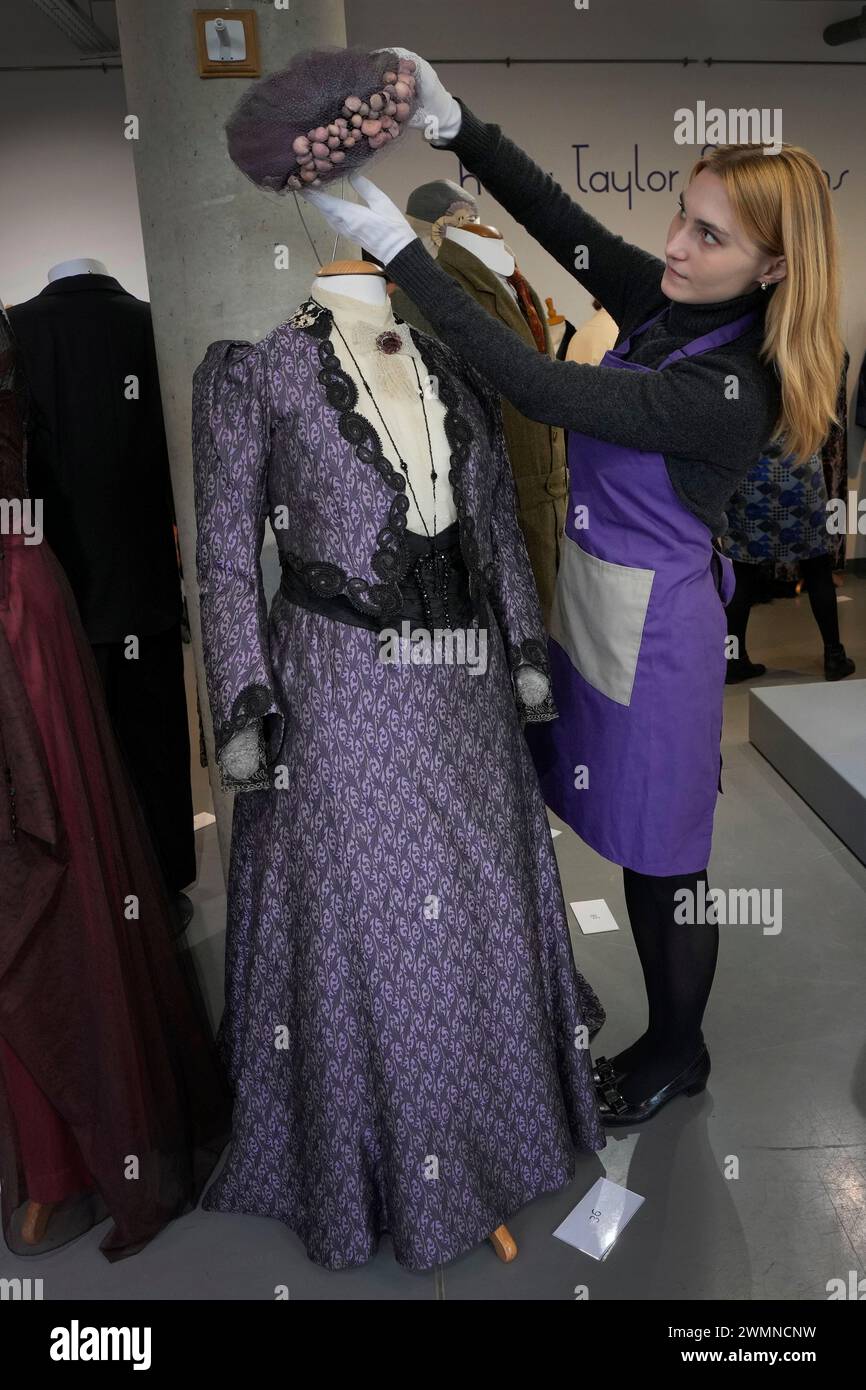 A costume handler arranges Dame Maggie Smith's costume as Violet ...