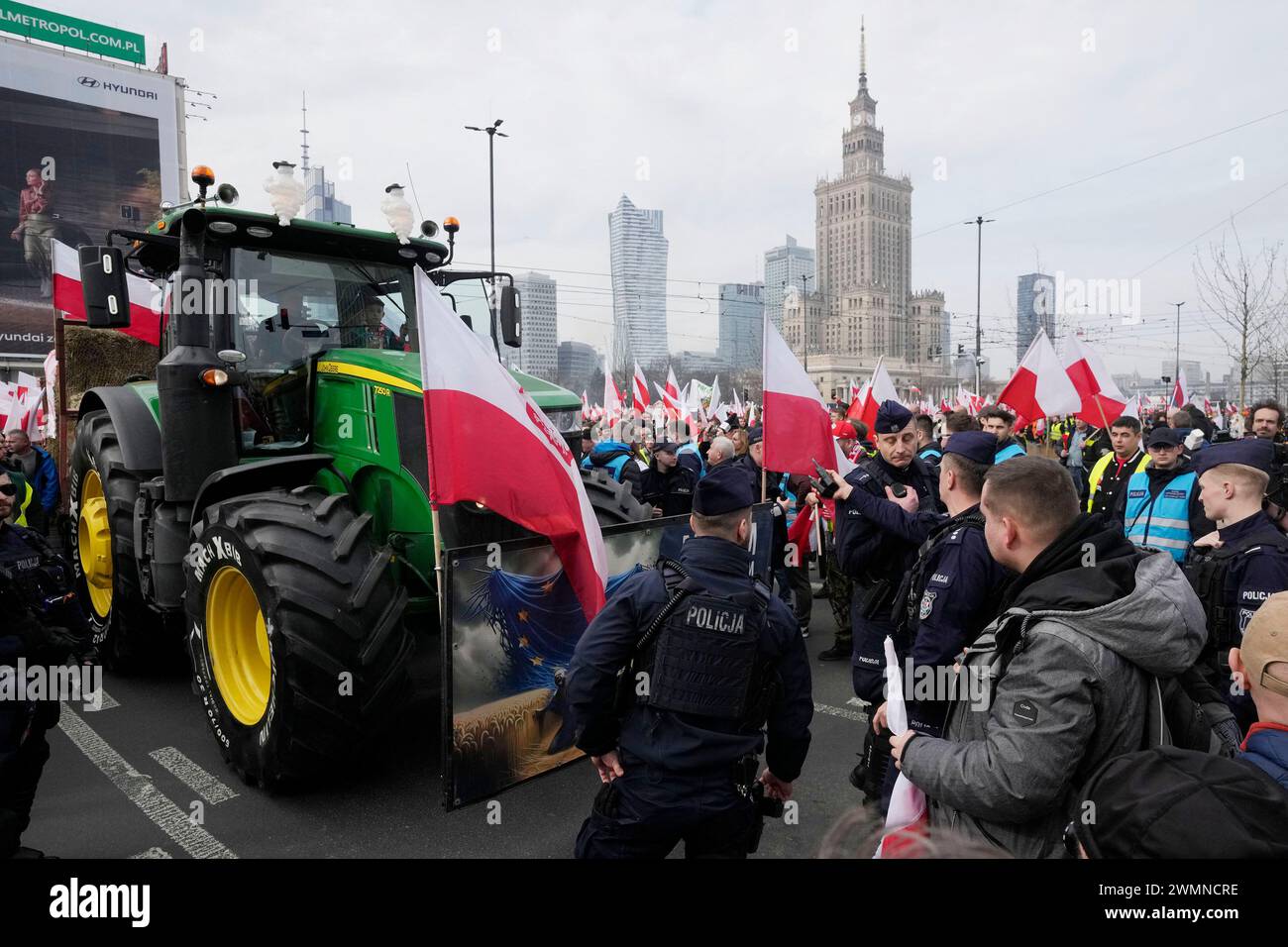 Polish farmers with national flags and angry slogans written on boards ...