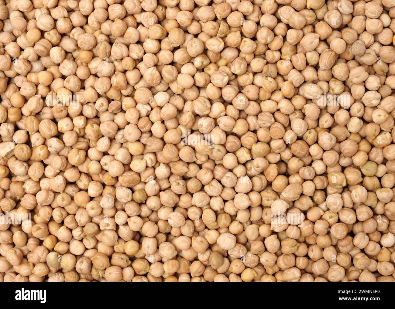 Dry raw organic chickpeas background Stock Photo - Alamy