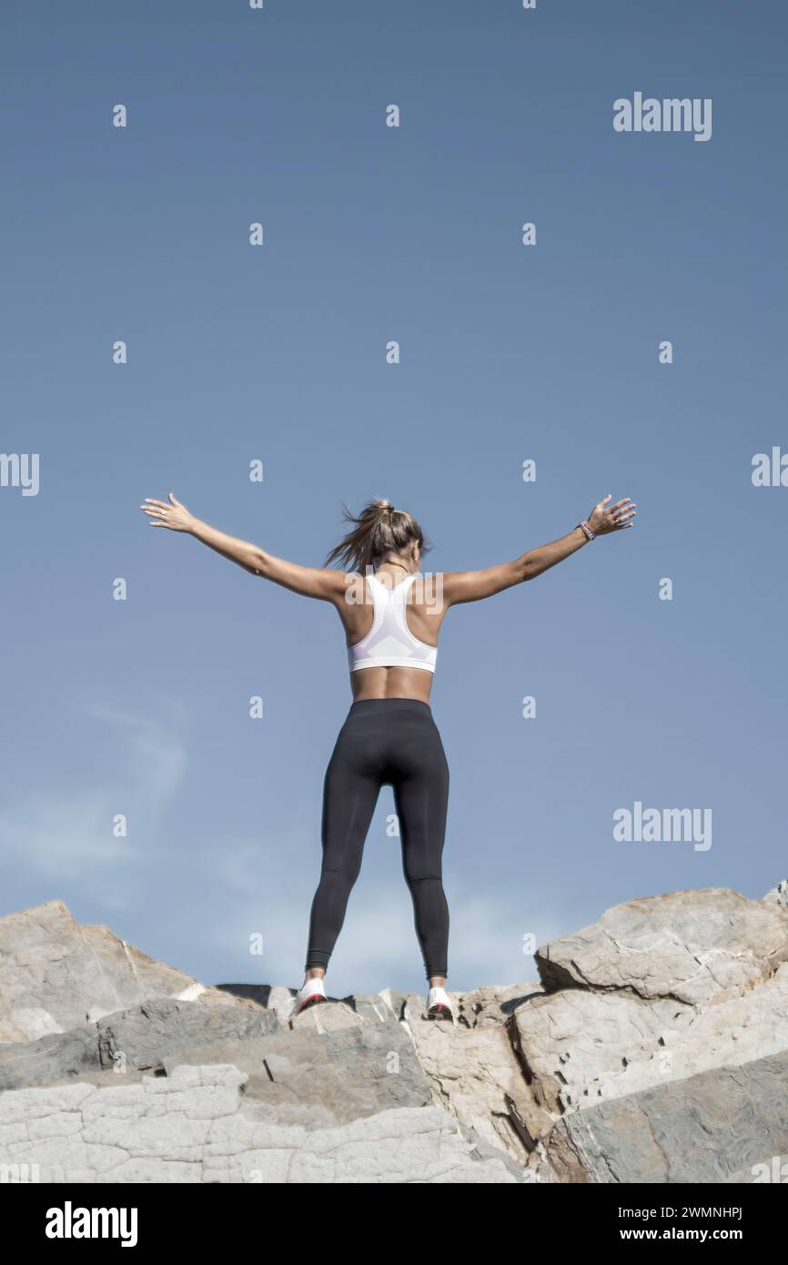 Woman arms up winner outdoors hi-res stock photography and images - Alamy
