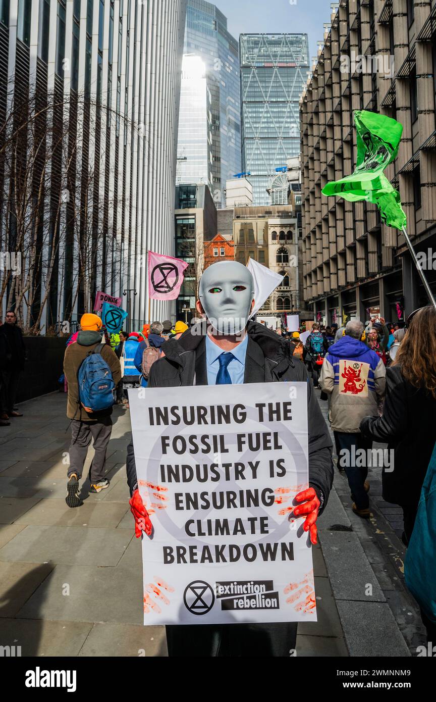 London, UK. 27th Feb, 2024. Faceless Financiers, with 'blood' on their ...