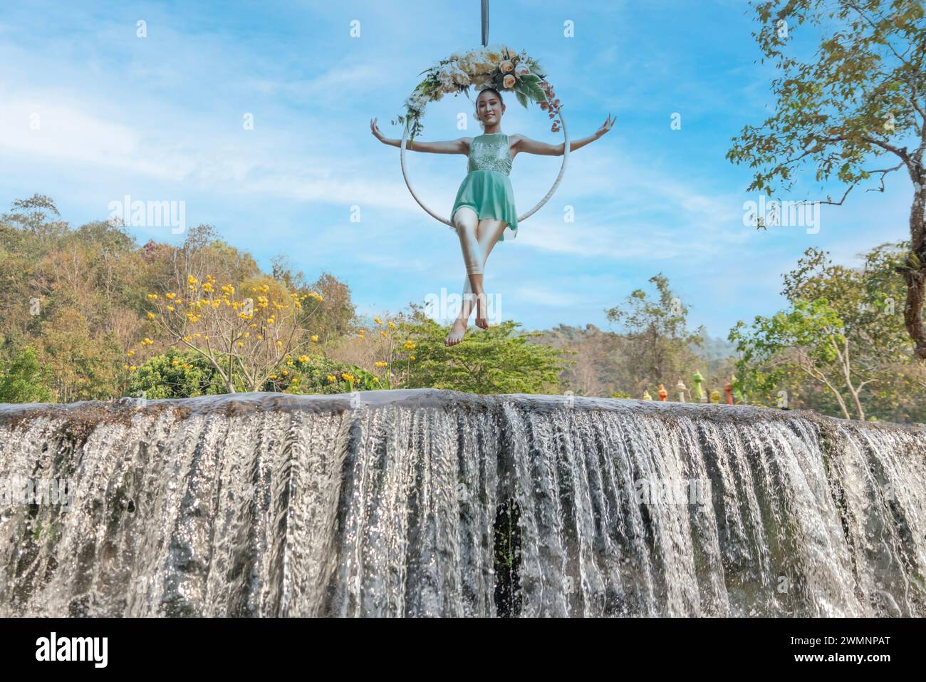 Beautiful Asian woman playing Rig and Hang Aerial Hook for Yoga in ...