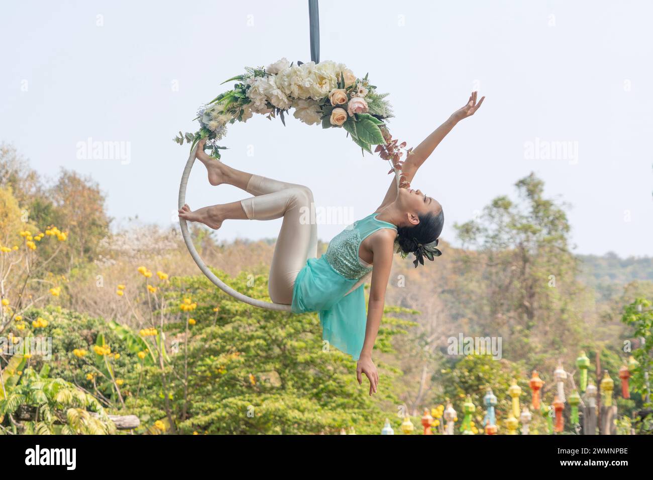 Beautiful Asian woman playing Rig and Hang Aerial Hook for Yoga in ...