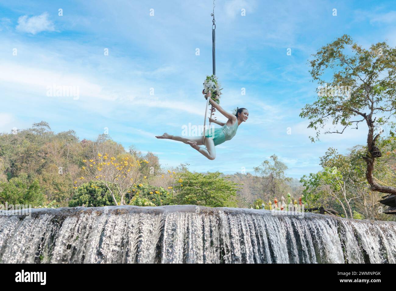 Beautiful Asian woman playing Rig and Hang Aerial Hook for Yoga in ...