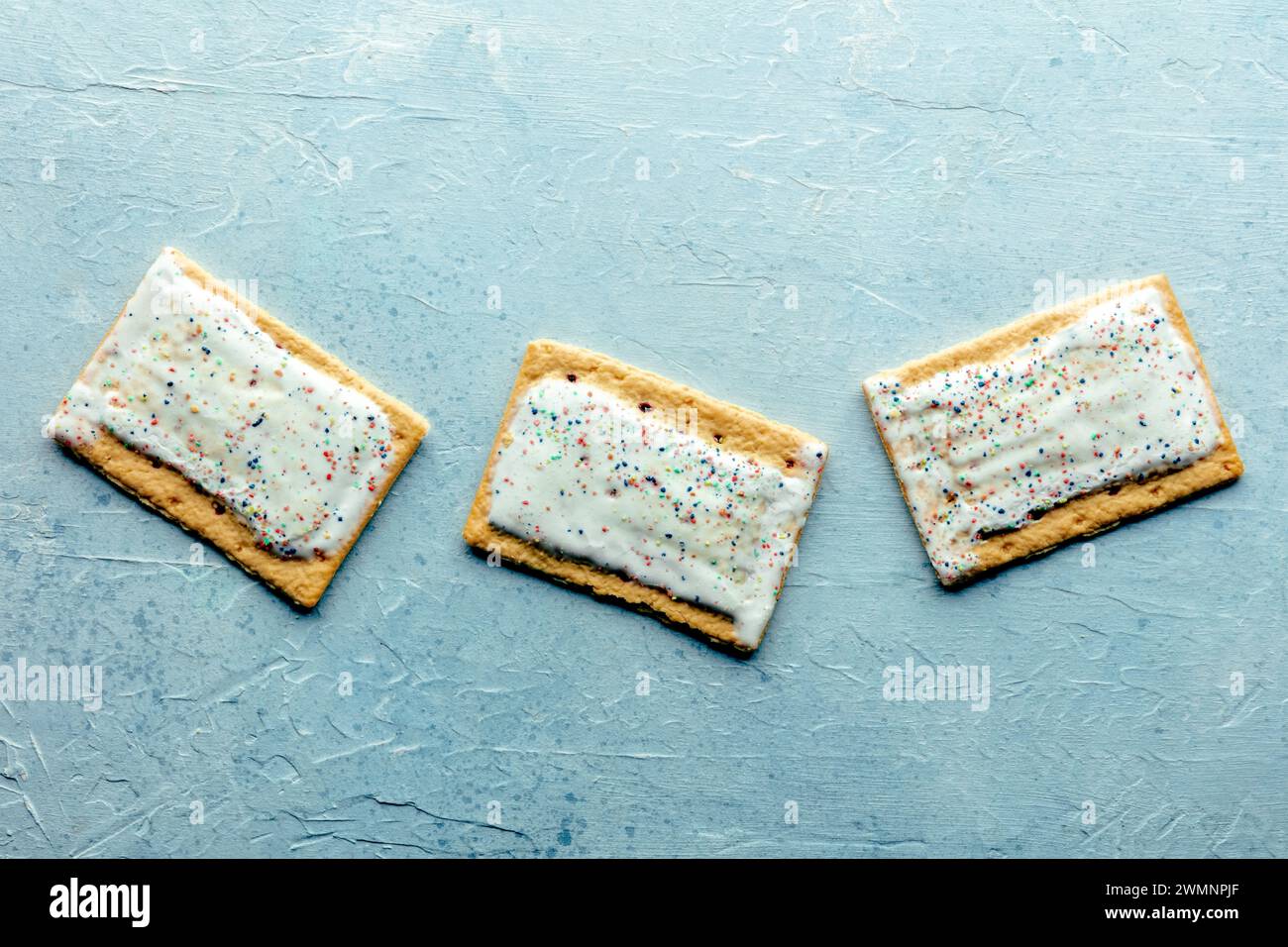 Pop tarts layout. Poptart toaster pastry with icing on a blue slate ...