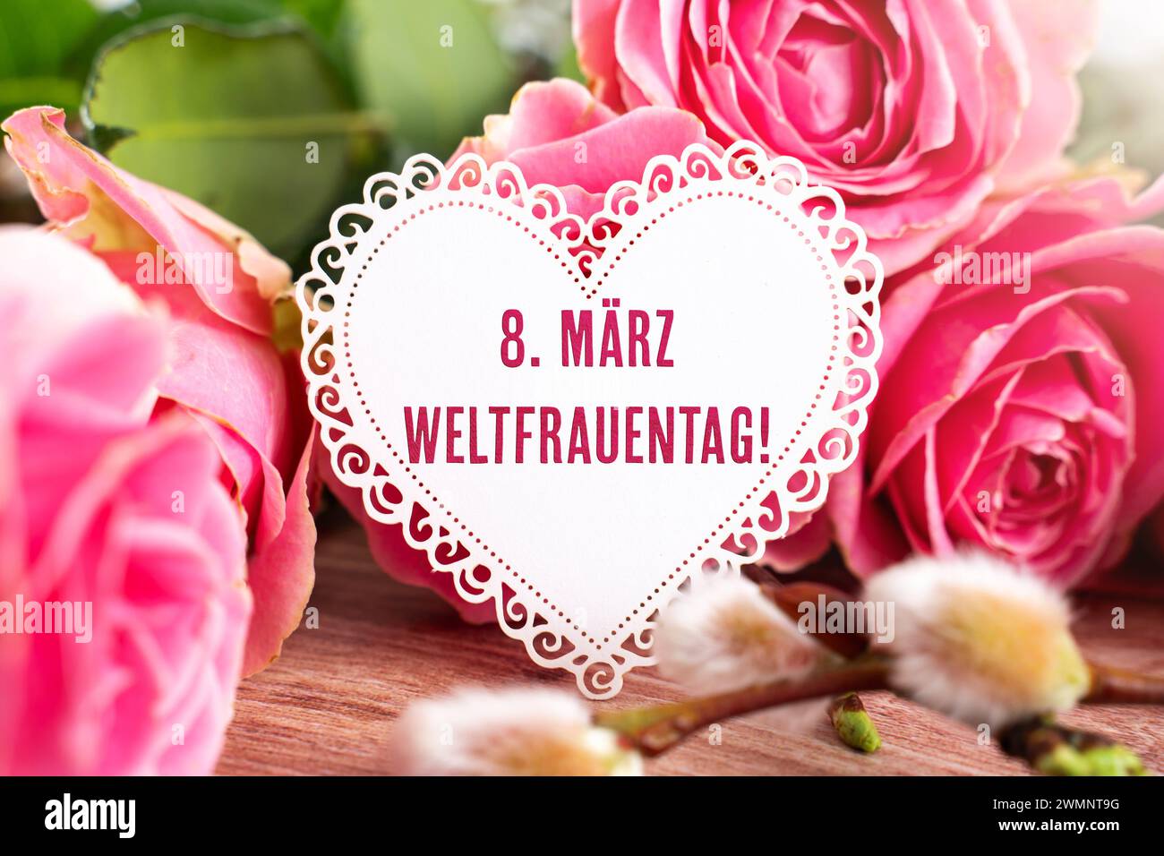 February 27, 2024: International Women s Day, heart next to bouquet of roses with inscription ...