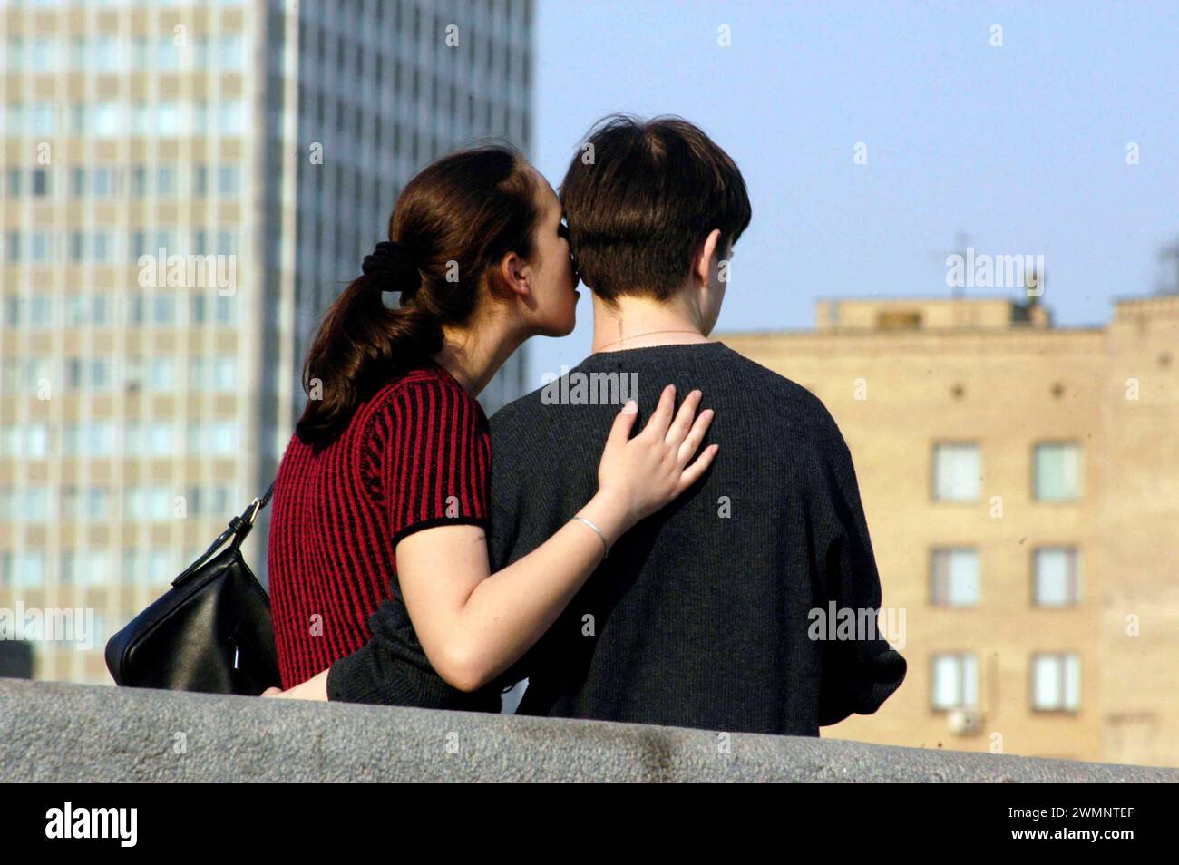 romantic partnership, couple touches and holds on to each other couple ...