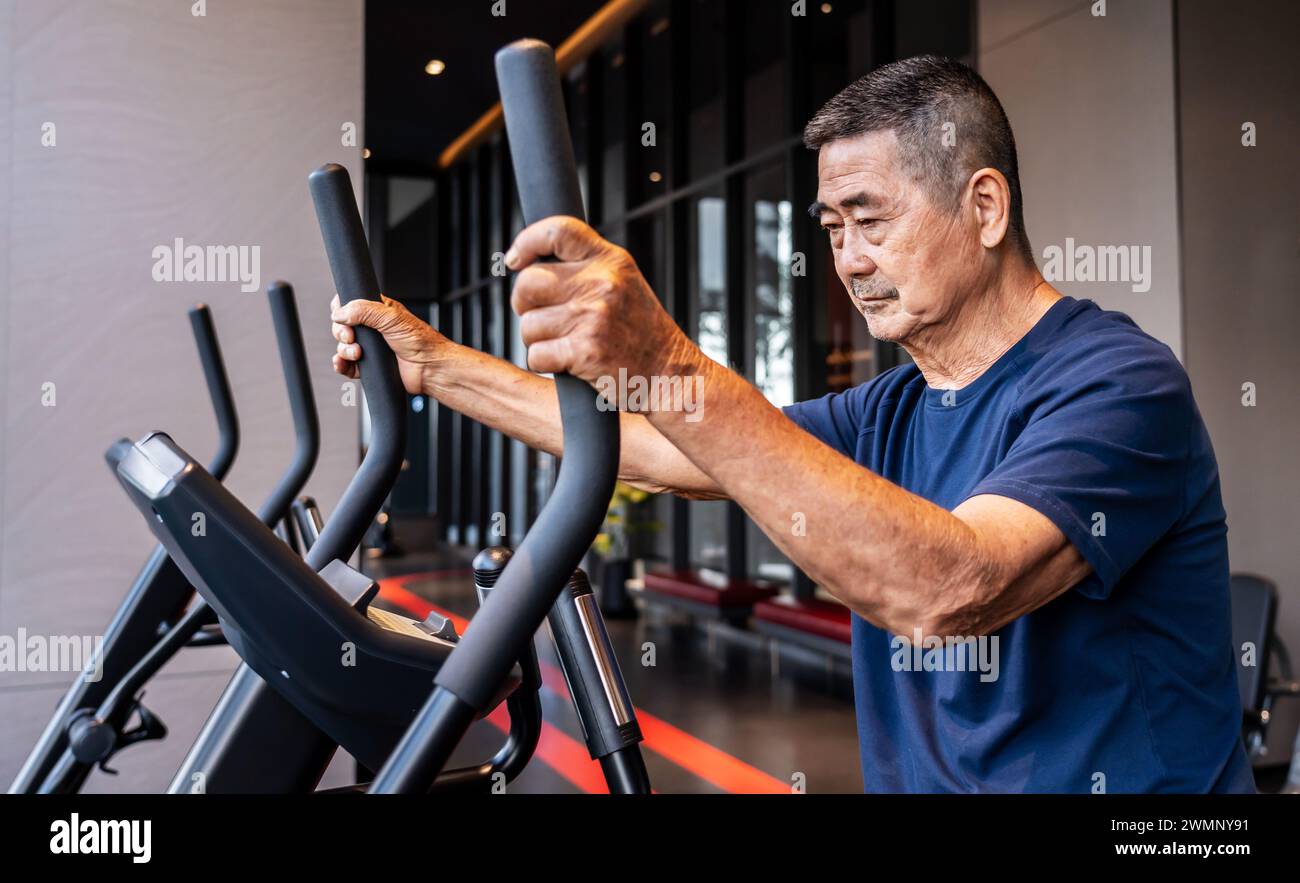 Older man running treadmill hi-res stock photography and images - Alamy