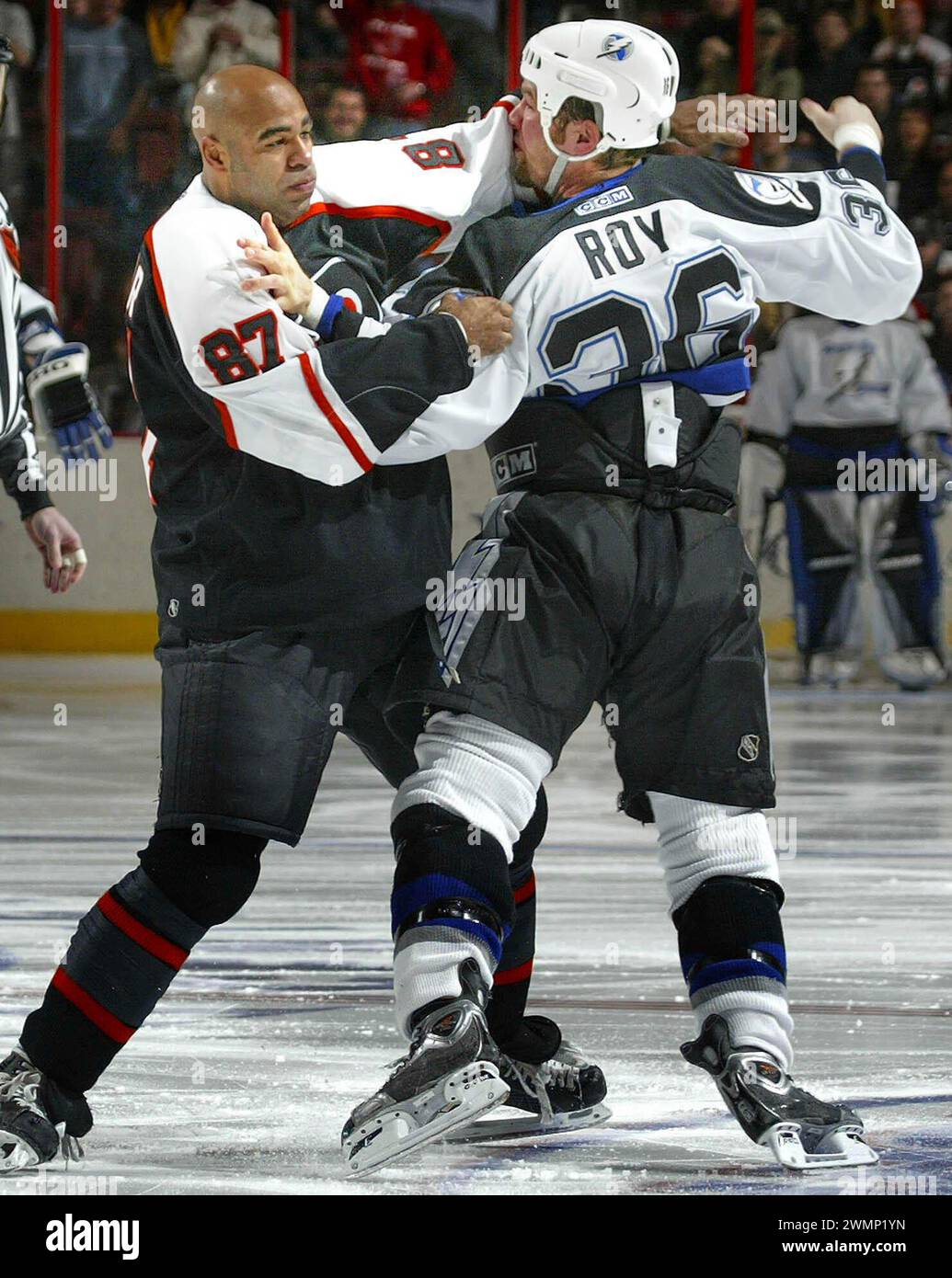 FILE - Tampa Bay Lightning's Andre Roy, right, and Philadelphia Flyers ...