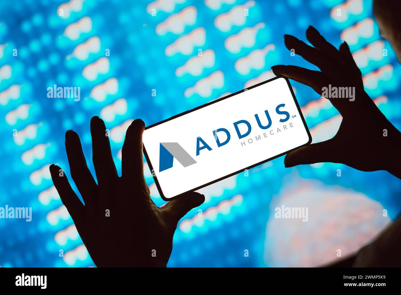 In this photo illustration, the Addus HomeCare Corporation logo is ...