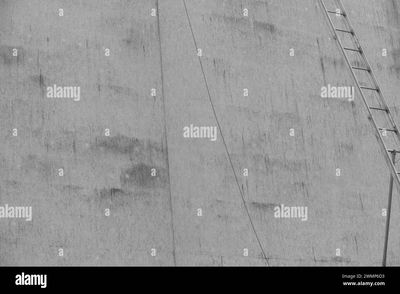 High ladder against the wall of a block of flats Stock Photo - Alamy