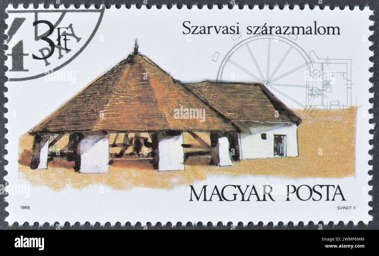 Cancelled postage stamp printed by Hungary, that shows Horse-driven ...