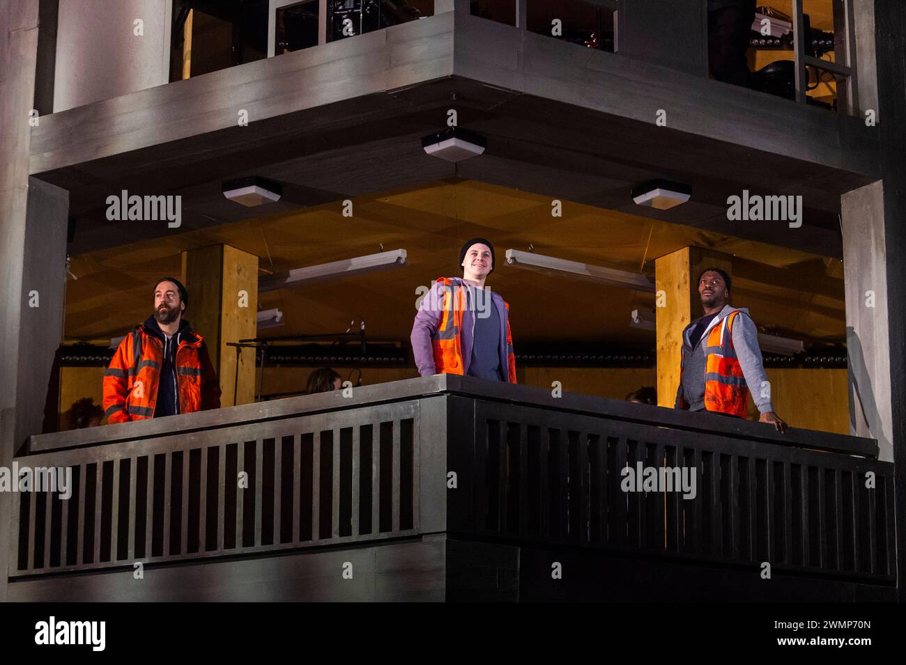 London, UK. 27 February 2024. (C) Jonathon Bentley as Workman 1, and ...