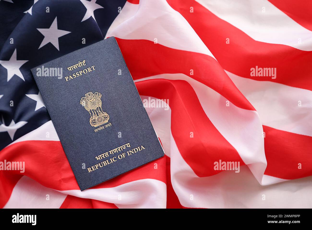 Blue Indian Passport On United States National Flag Background Close Up 2780