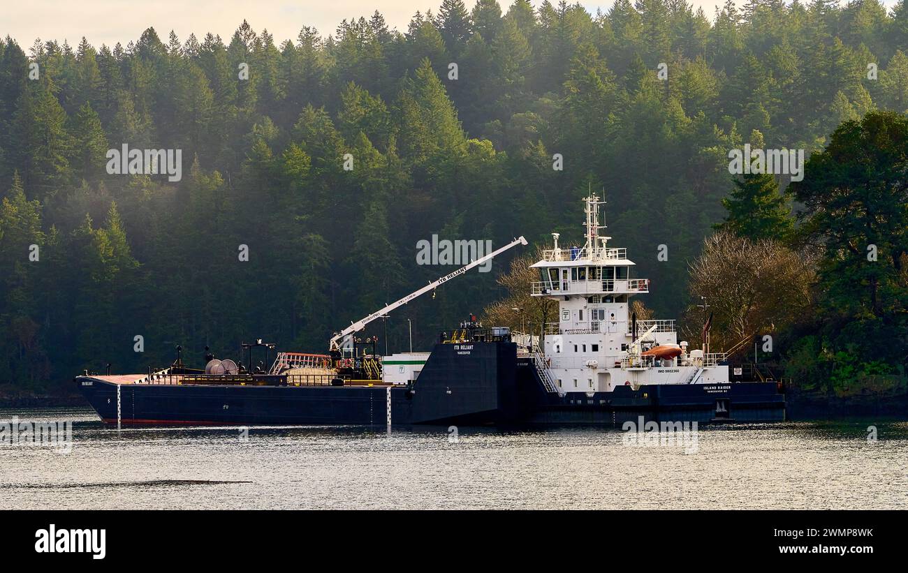 Island Raider pusher tug and ITB Reliant fuel barge moored at Departure ...