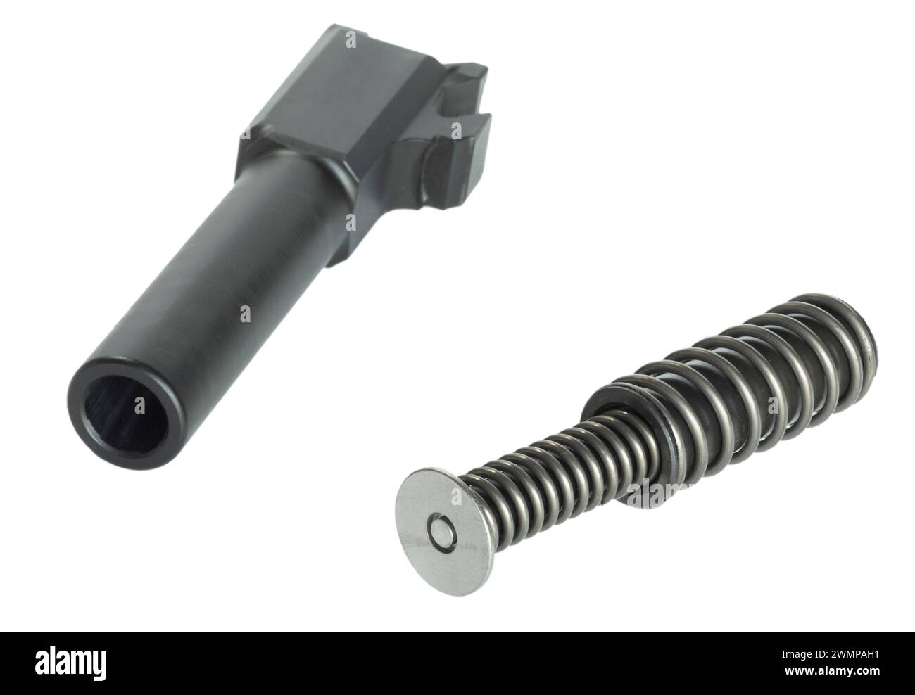 Recoil spring assembly and barrel removed from a semi-automatic pistol ...