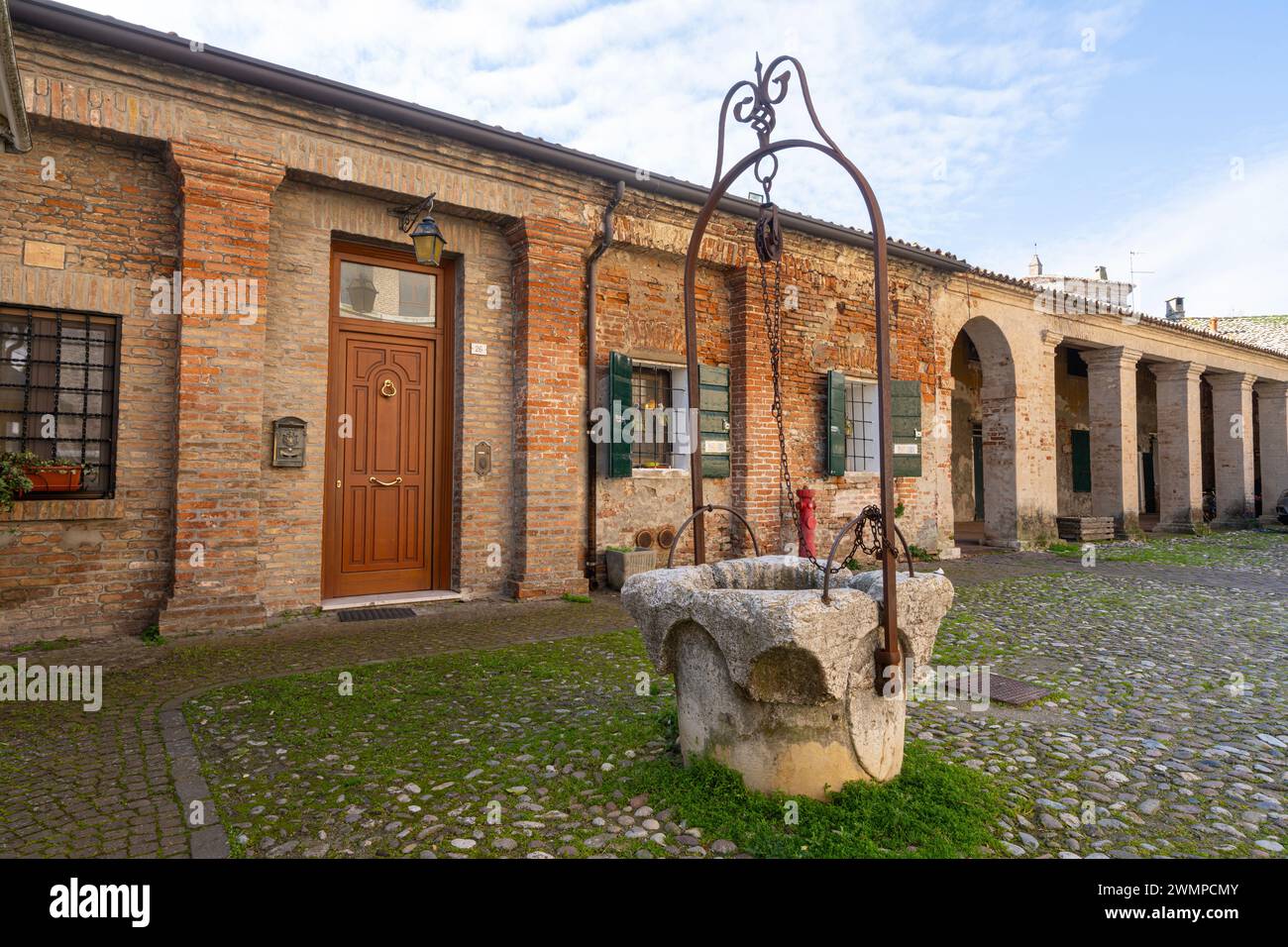 Mesola, Italy. February 25, 2024. The buildings around the courtyard of ...