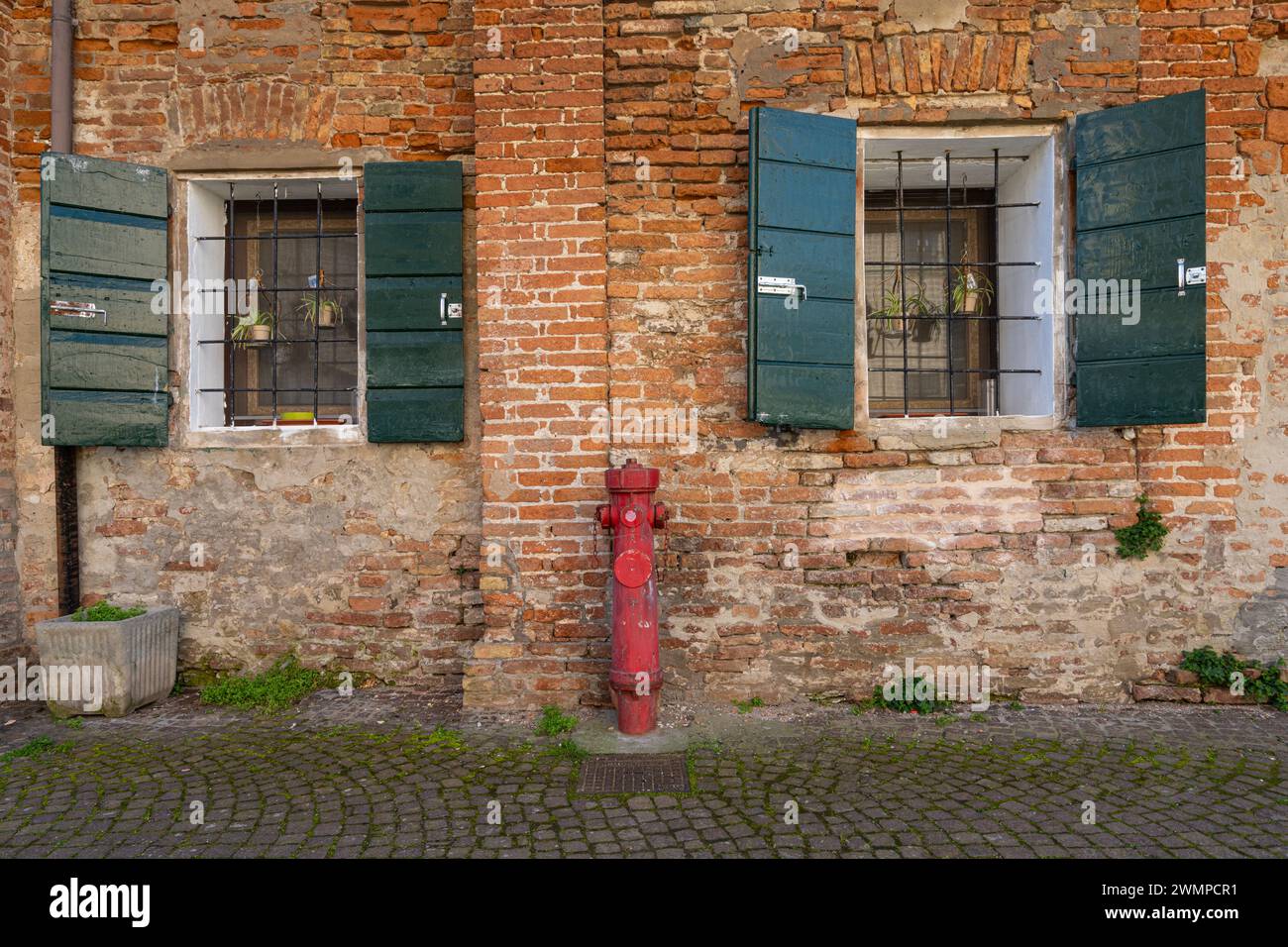Mesola, Italy. February 25, 2024. The buildings around the courtyard of ...
