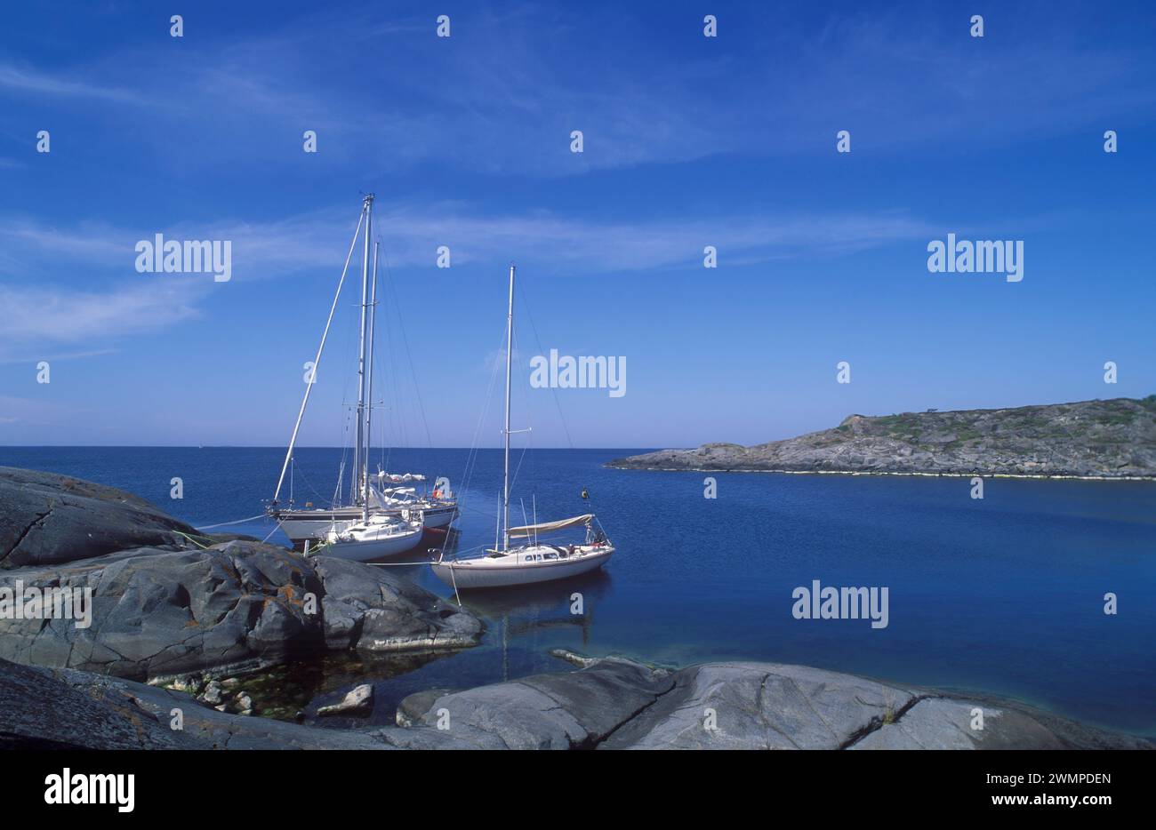 Sailingboats in natural harbour Stock Photo - Alamy