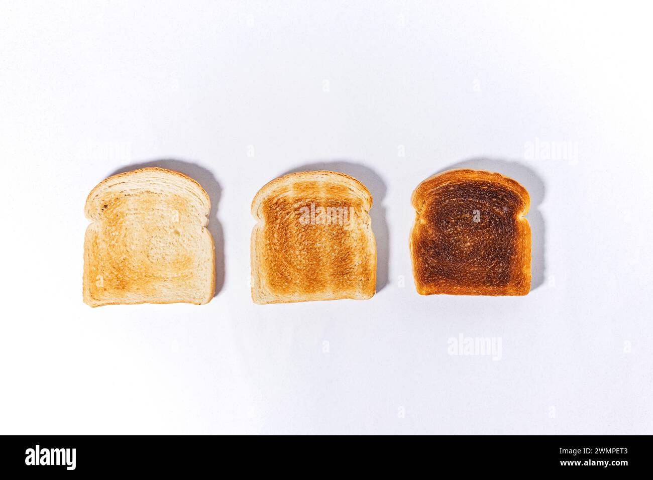 Three slices of bread toasted for a different level, sandwich square ...