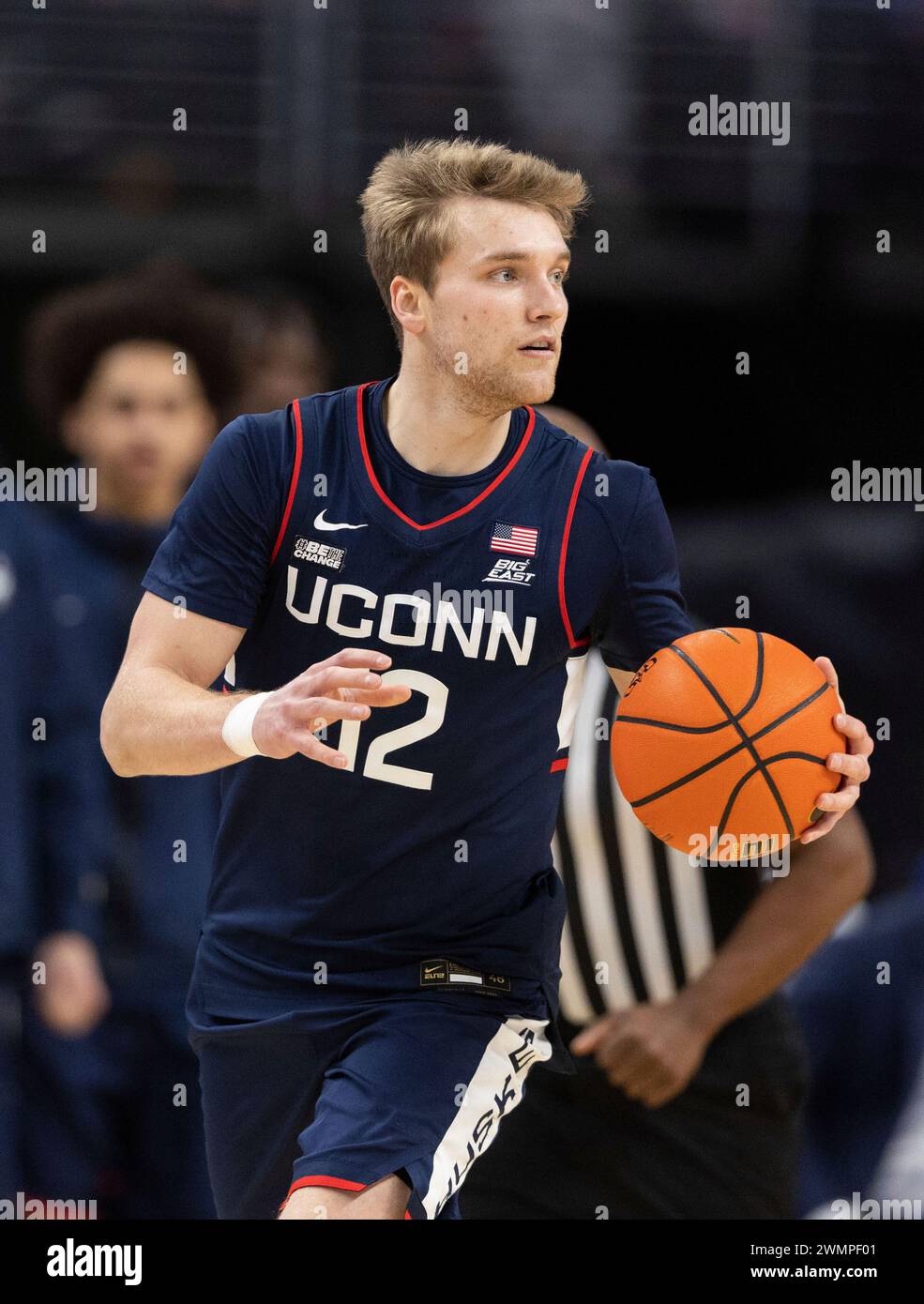 UConn's Cam Spencer (12) plays against Creighton during the first half ...
