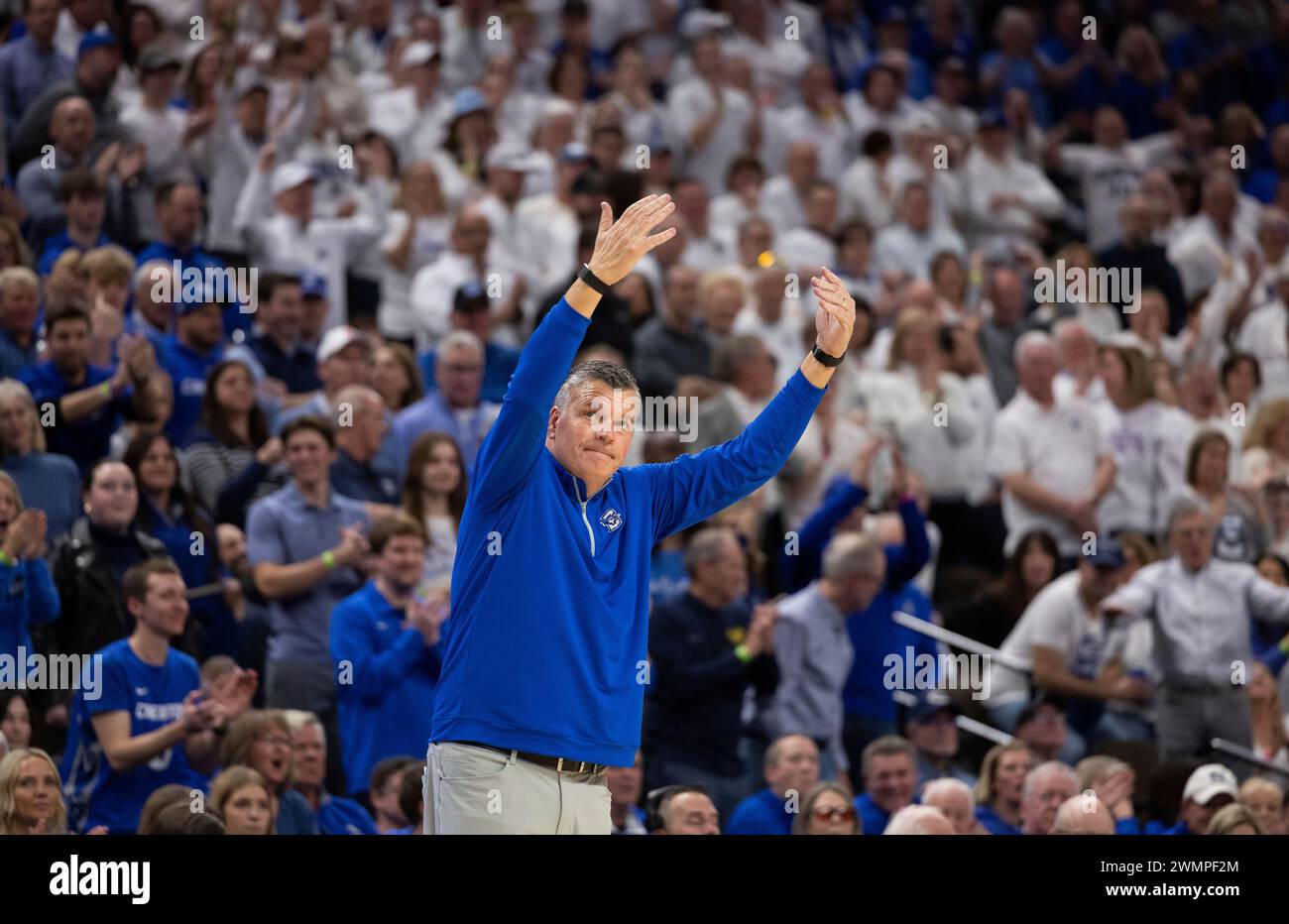 Creighton head coach Greg McDermott signals his team as they play ...